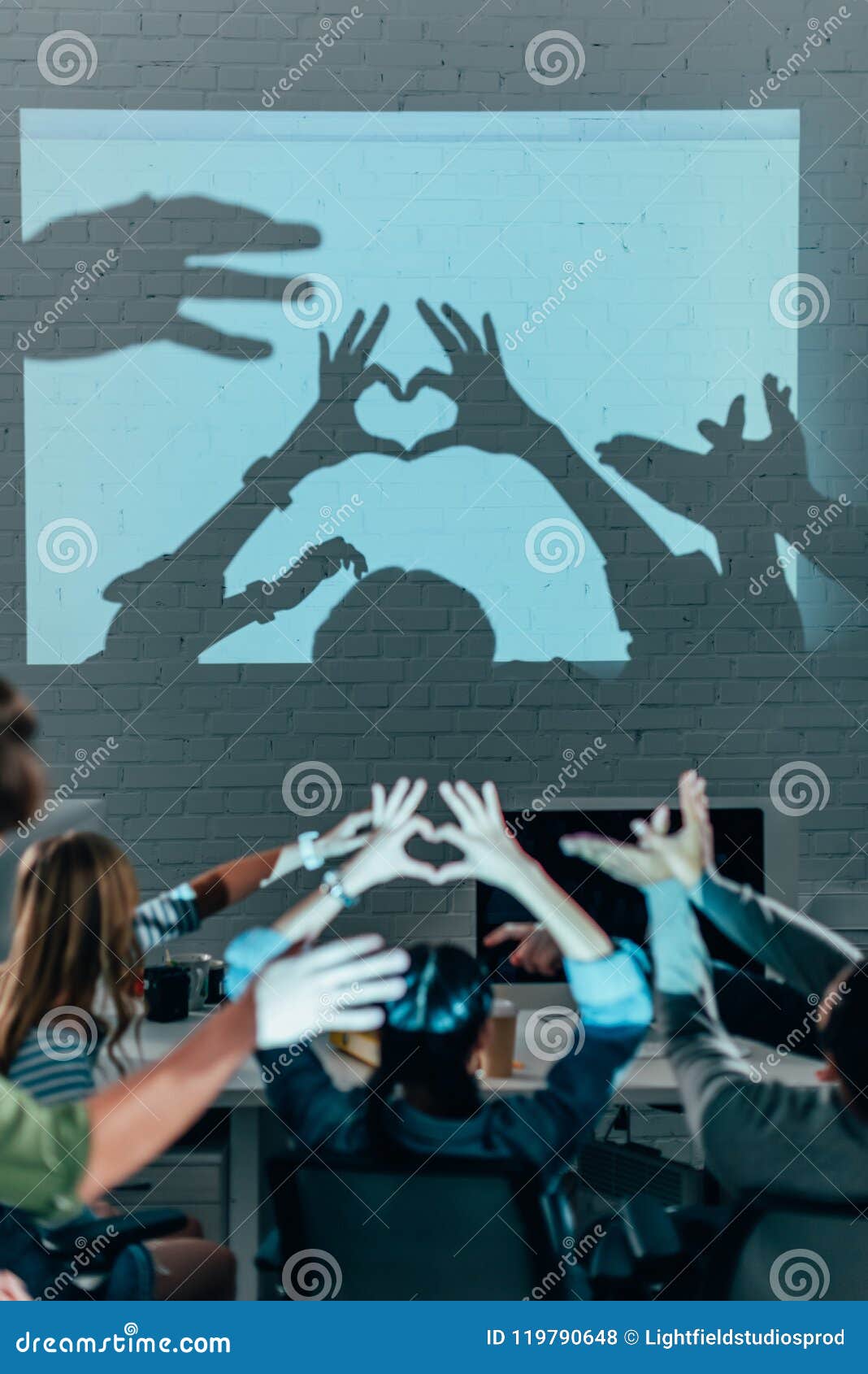 Young People Playing with Shadows after Work Stock Photo - Image of ...