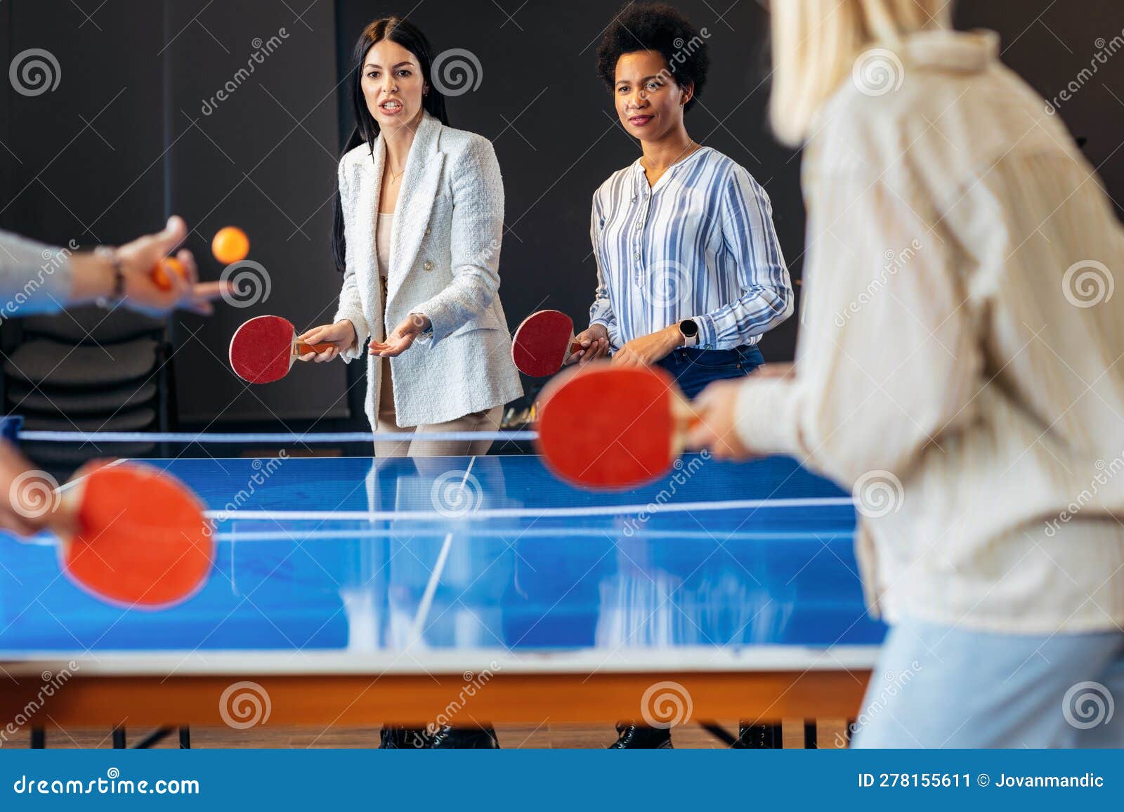 People Playing Table Tennis in the Office at Work Stock Image - Image ...