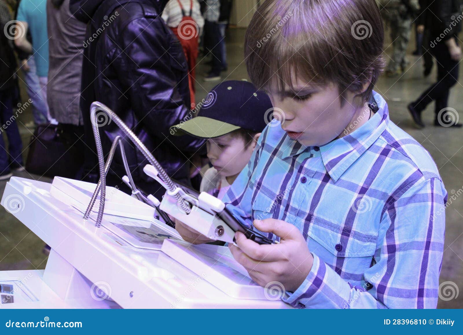 Young People Playing Video Games Editorial Image - Image of exhibition ...