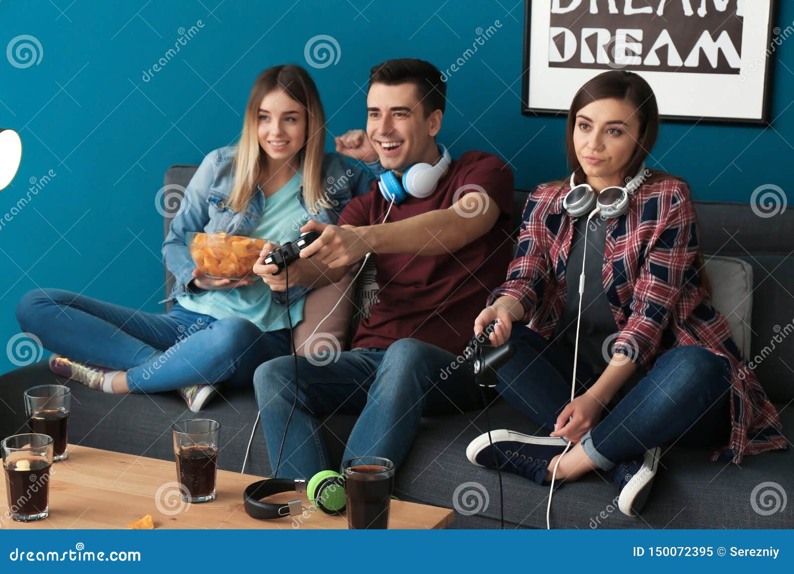 Young People Playing Video Games at Home Stock Image - Image of female ...