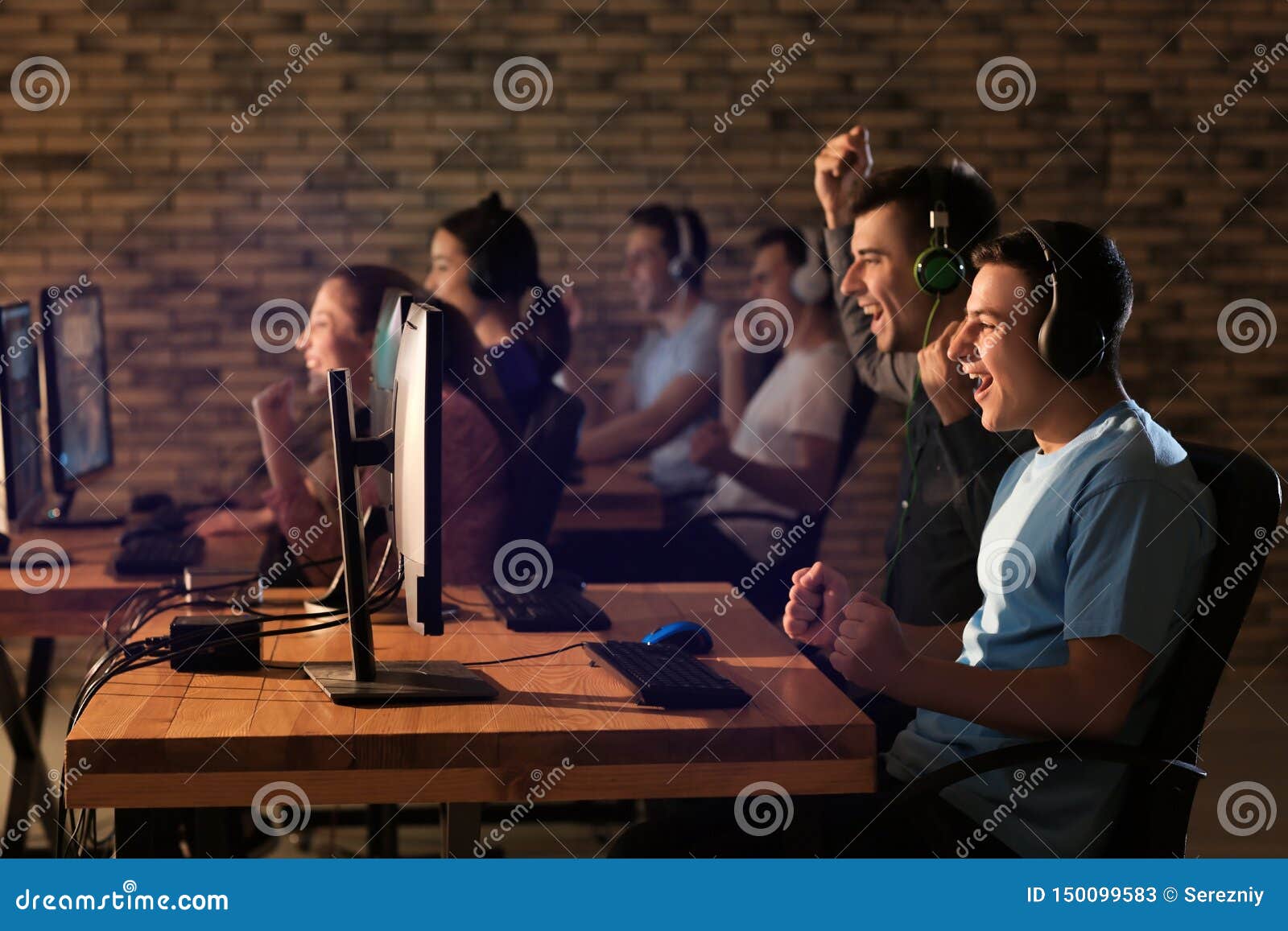 Young People Playing Video Games at Tournament Stock Image - Image of ...