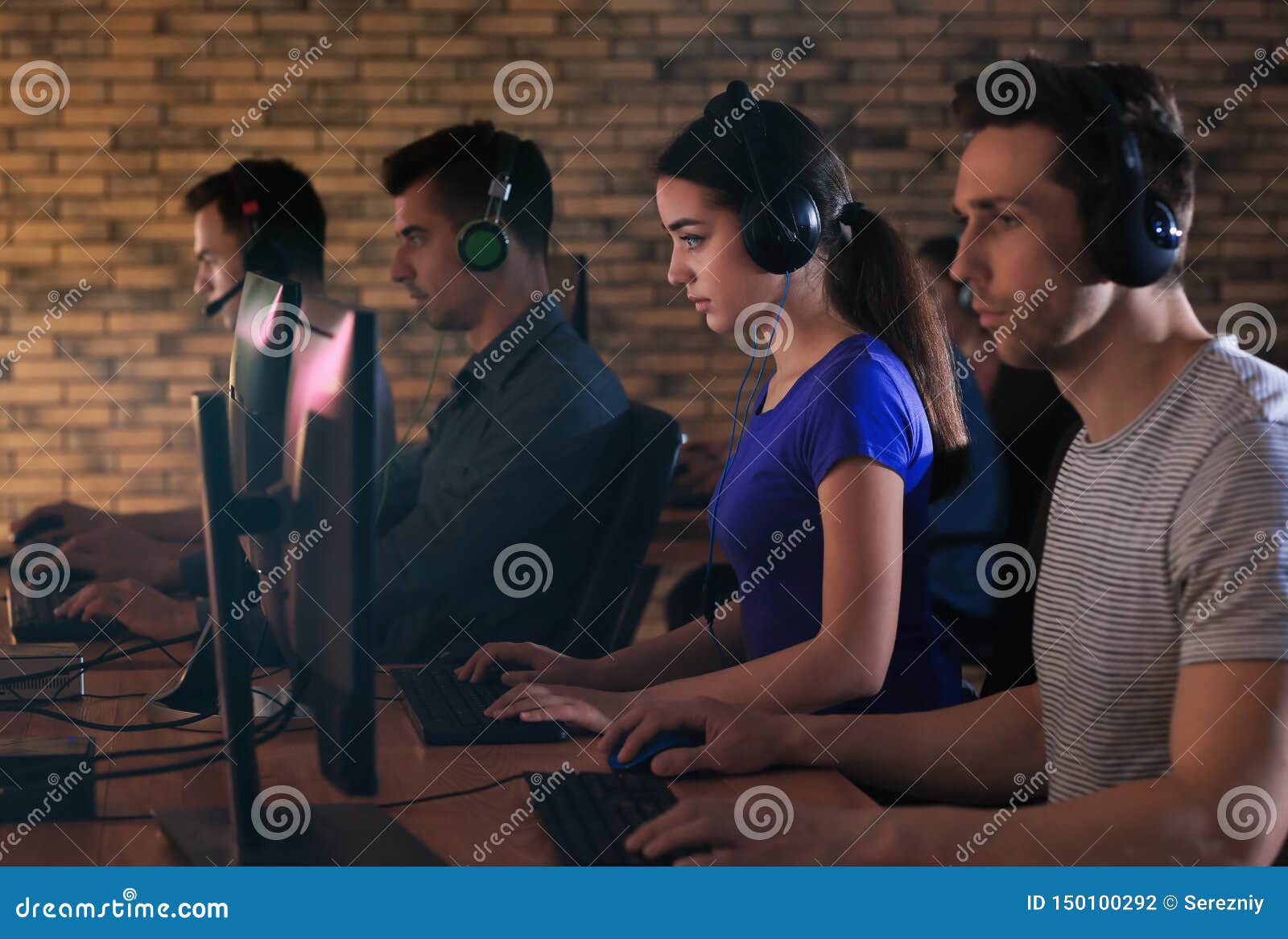 Young People Playing Video Games at Tournament Stock Photo - Image of ...