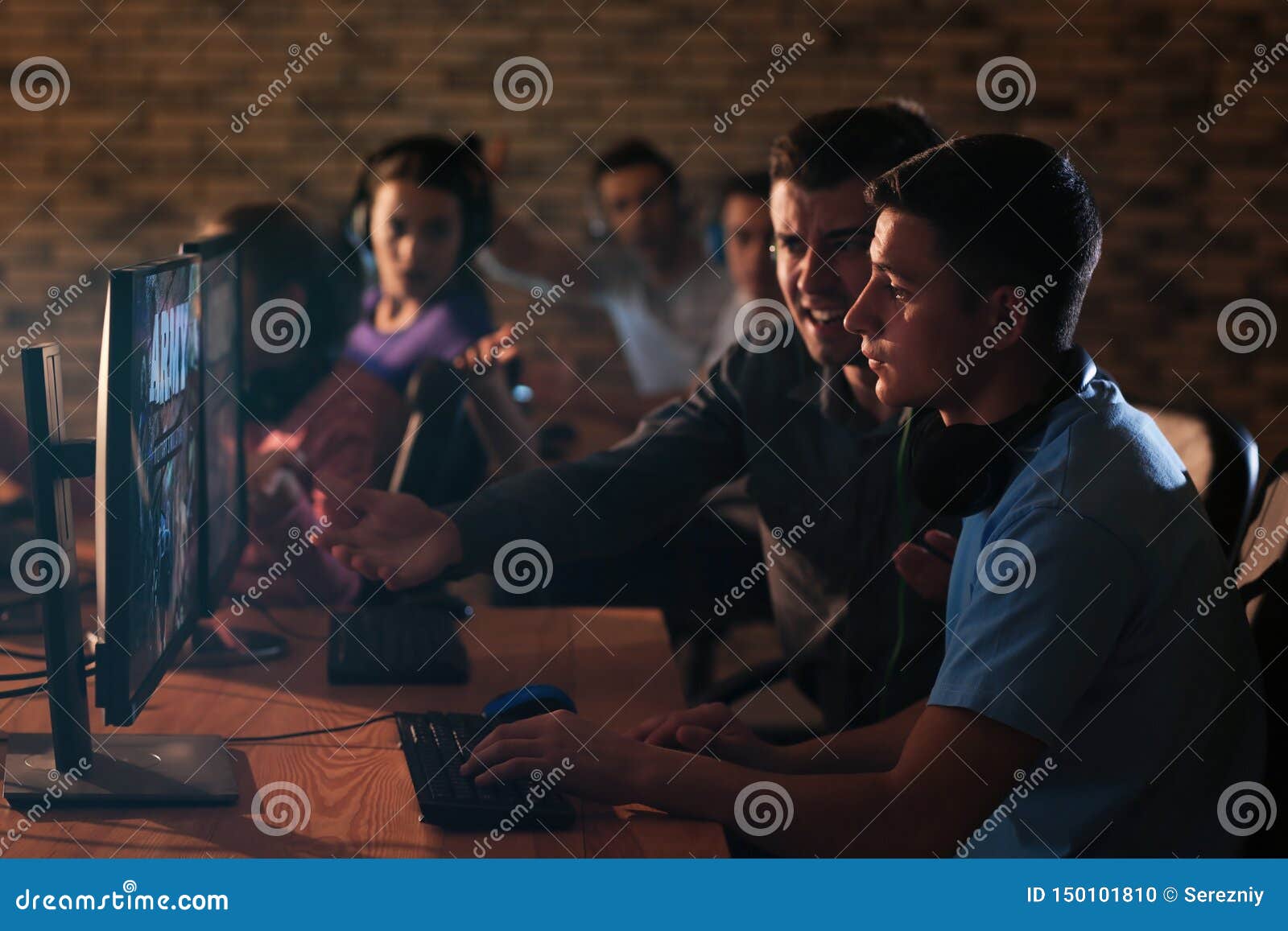 Young People Playing Video Games at Tournament Stock Photo - Image of ...