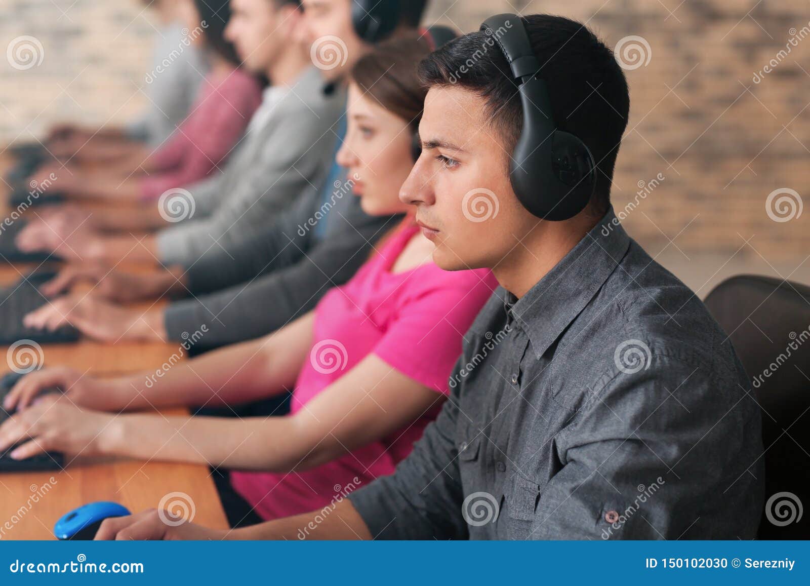 Young People Playing Video Games at Tournament Stock Photo - Image of ...