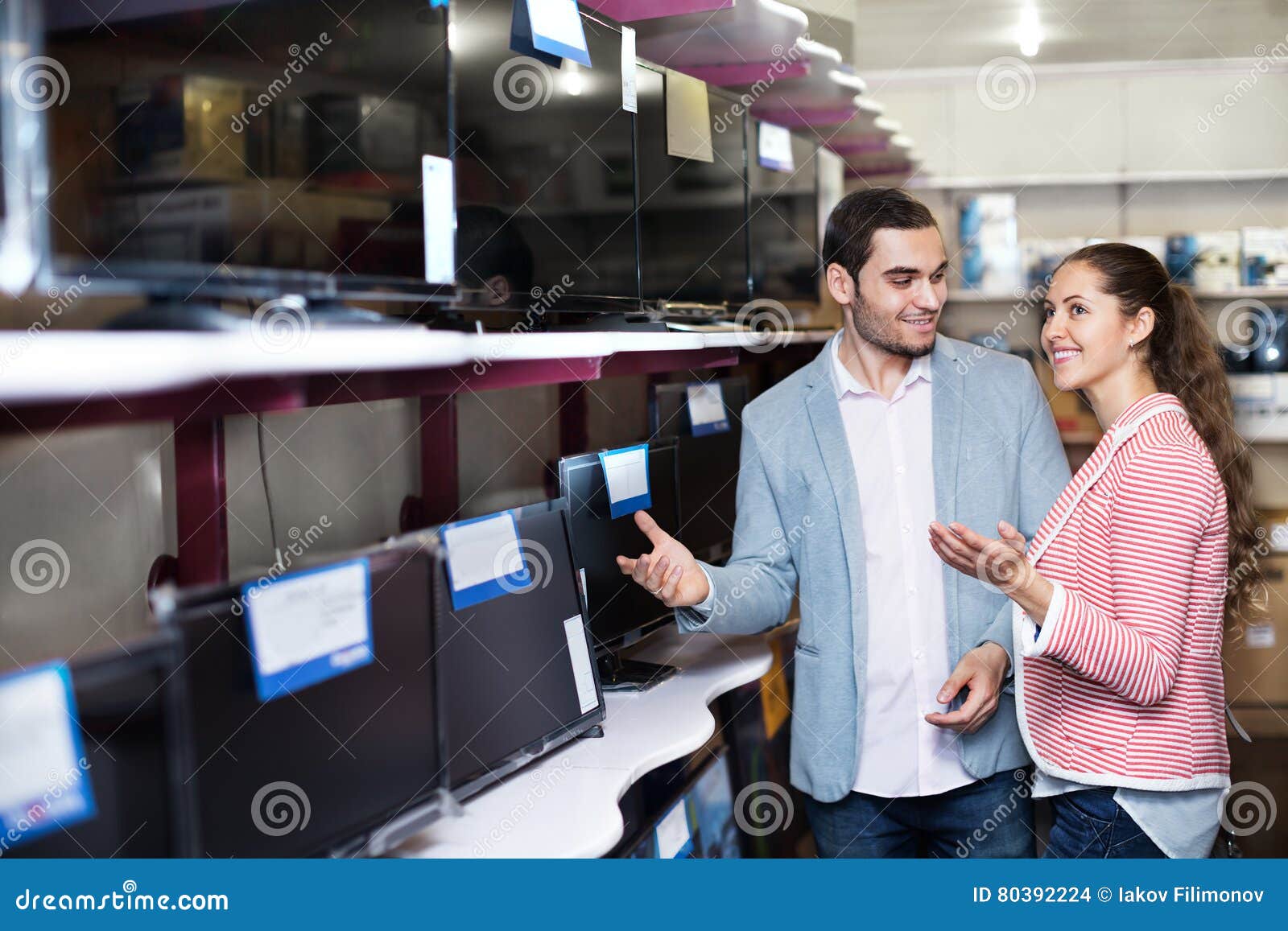 Young People Purchasing Television Set Stock Photo - Image of caucasian ...