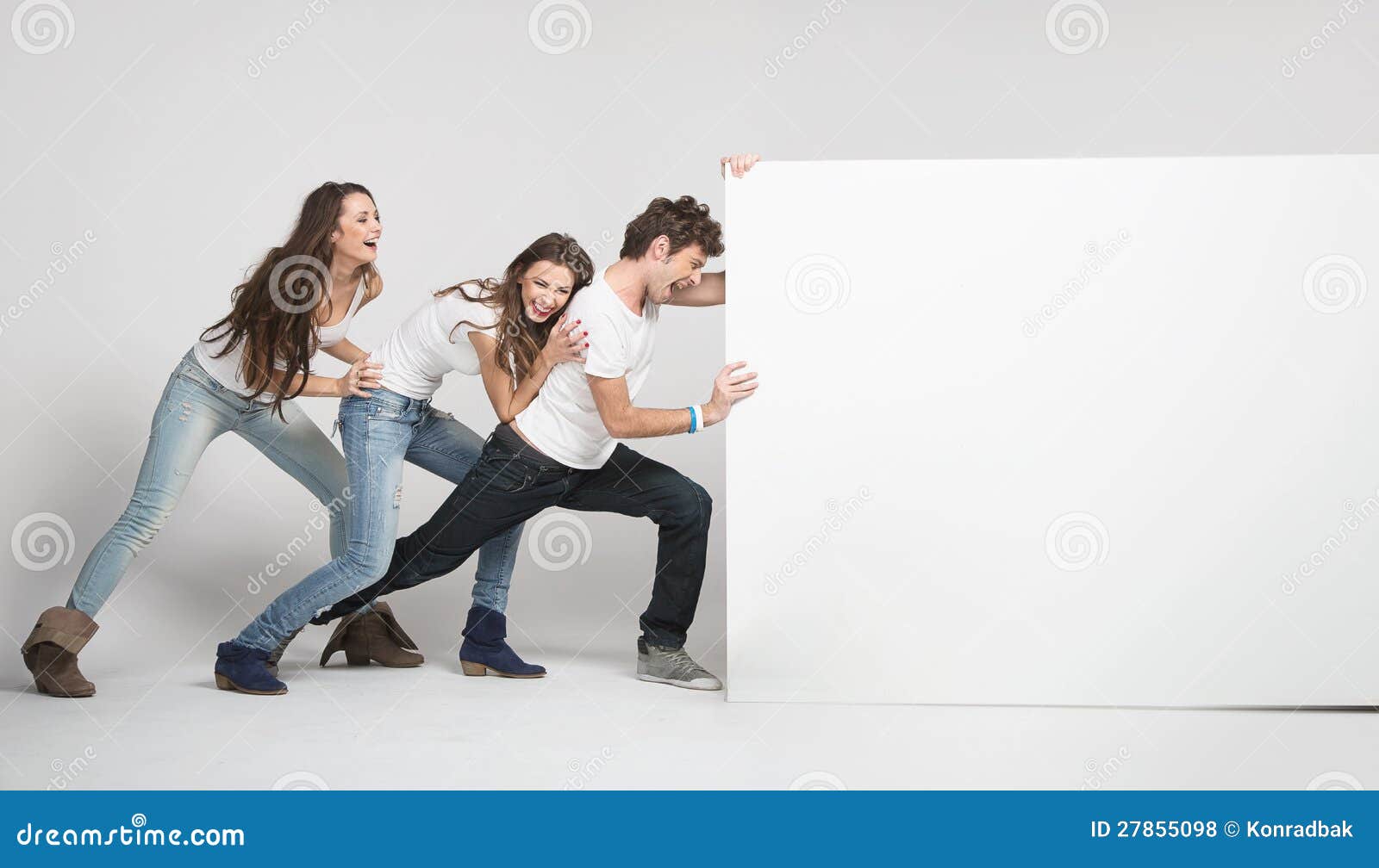 Young People Pushing White Board Royalty Free Stock Photos - Image ...