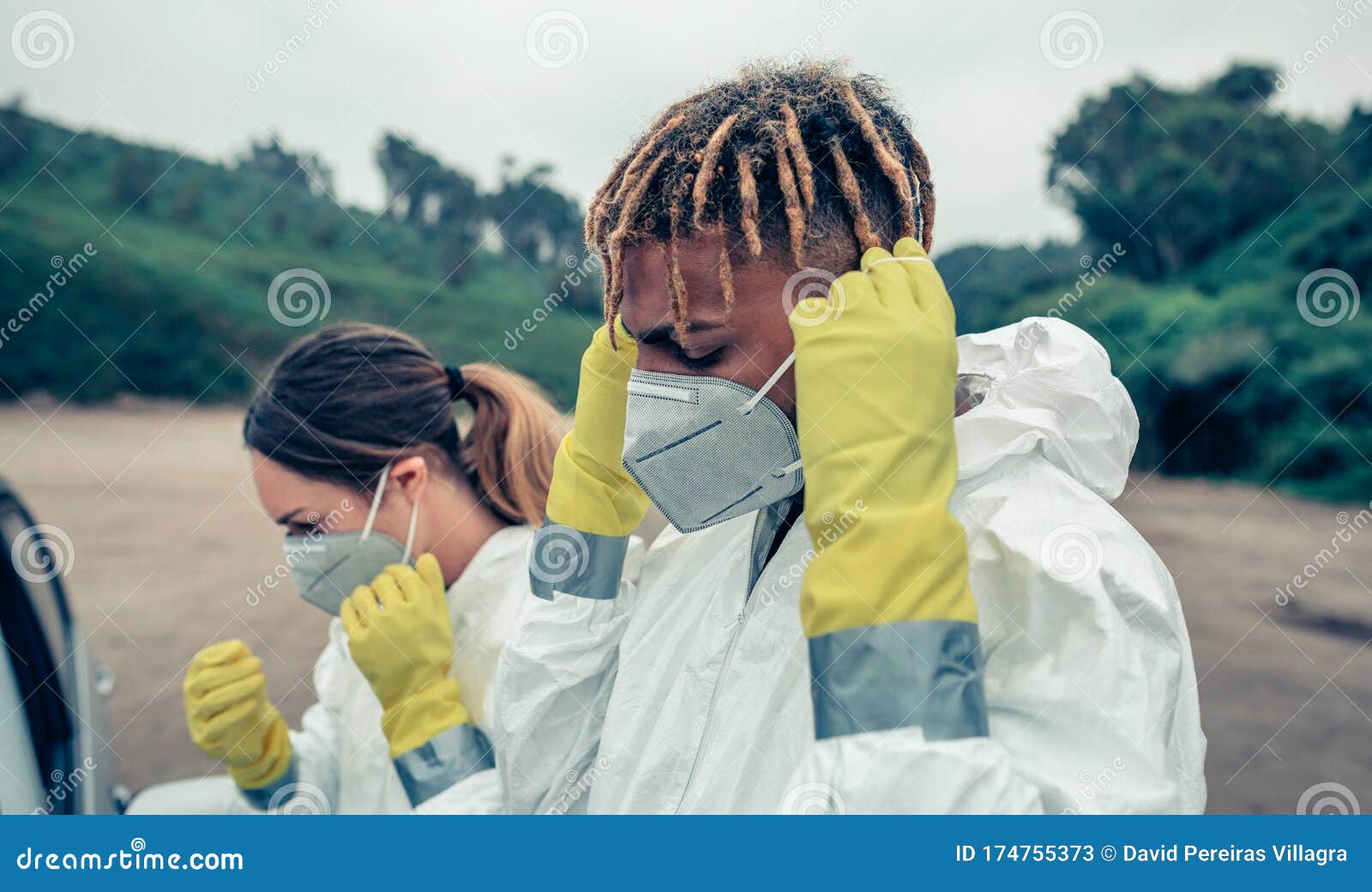 Young People Putting on Protective Masks Stock Image - Image of ...