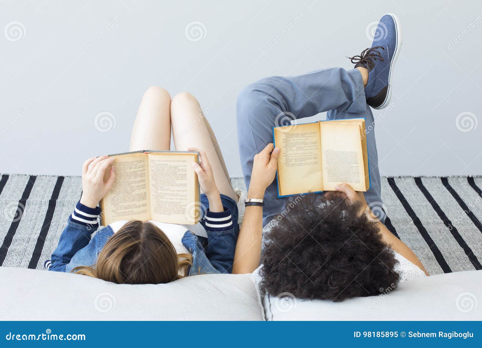 Young people reading book stock image. Image of together - 98185895