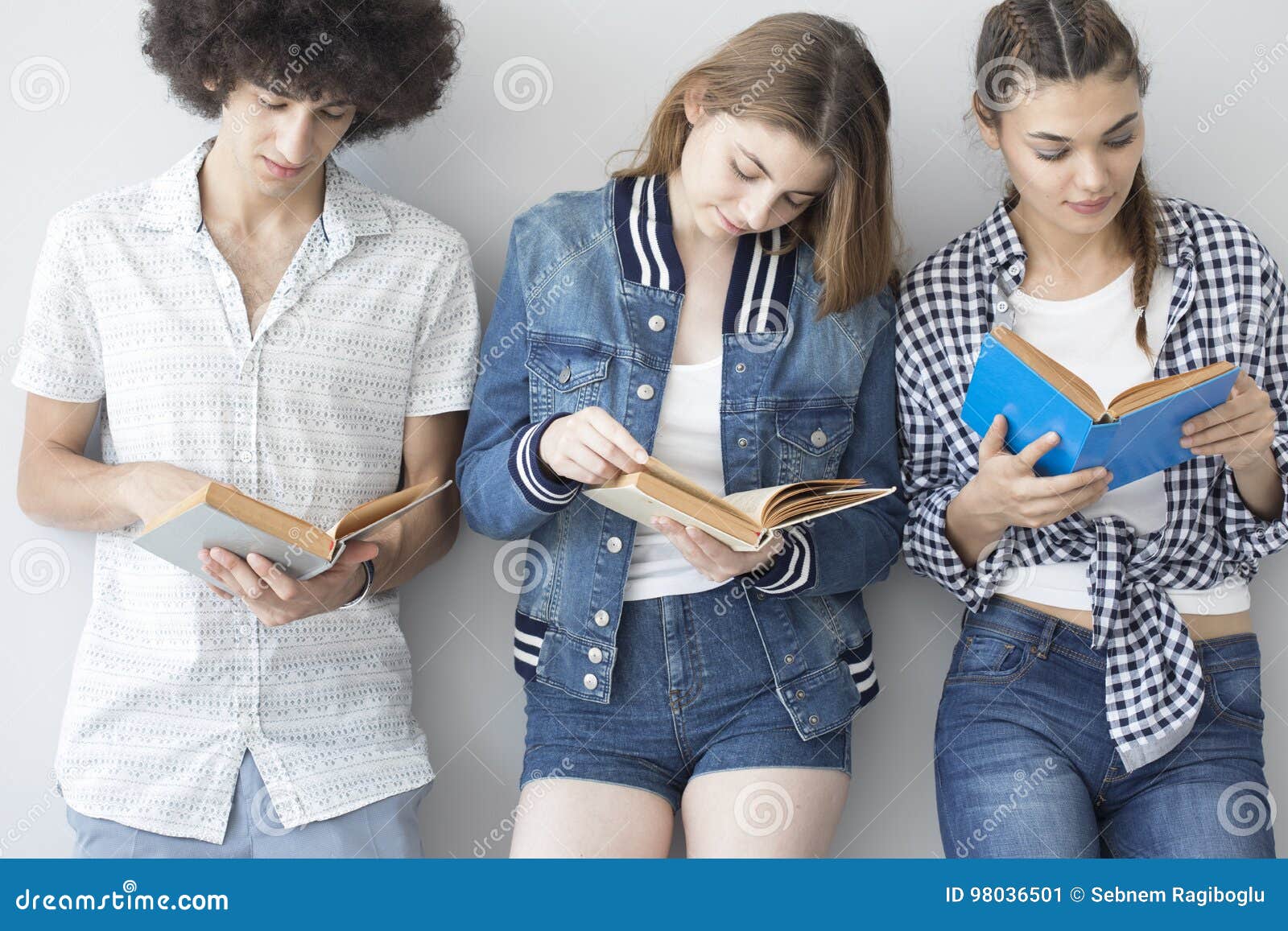 Young people reading books stock image. Image of studying - 98036501