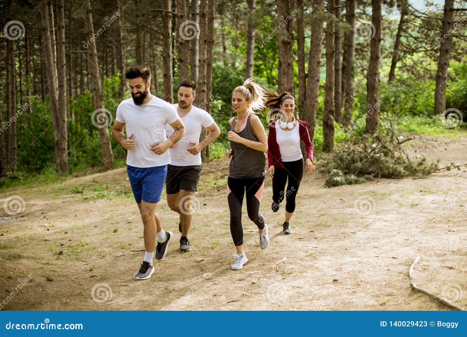 Group of Young People Run a Marathon through the Forest Stock Image ...