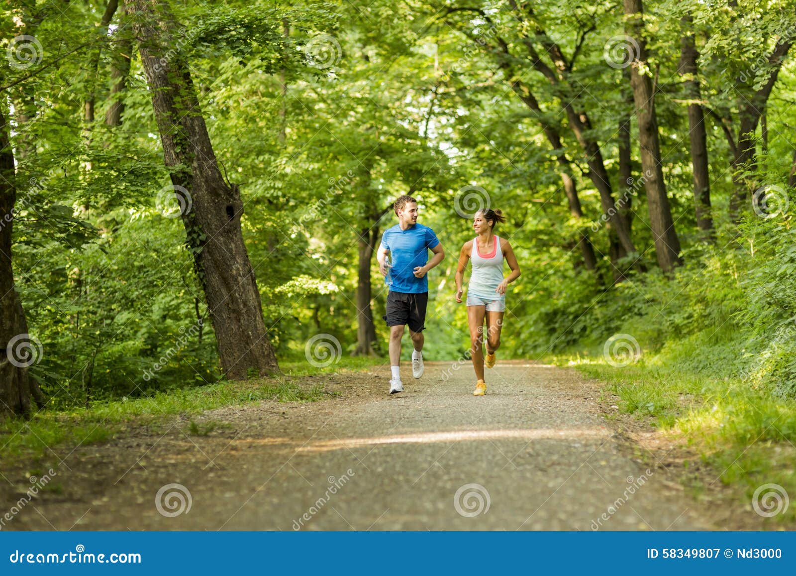 Young People Running in Nature Stock Image - Image of outdoors, jogging ...