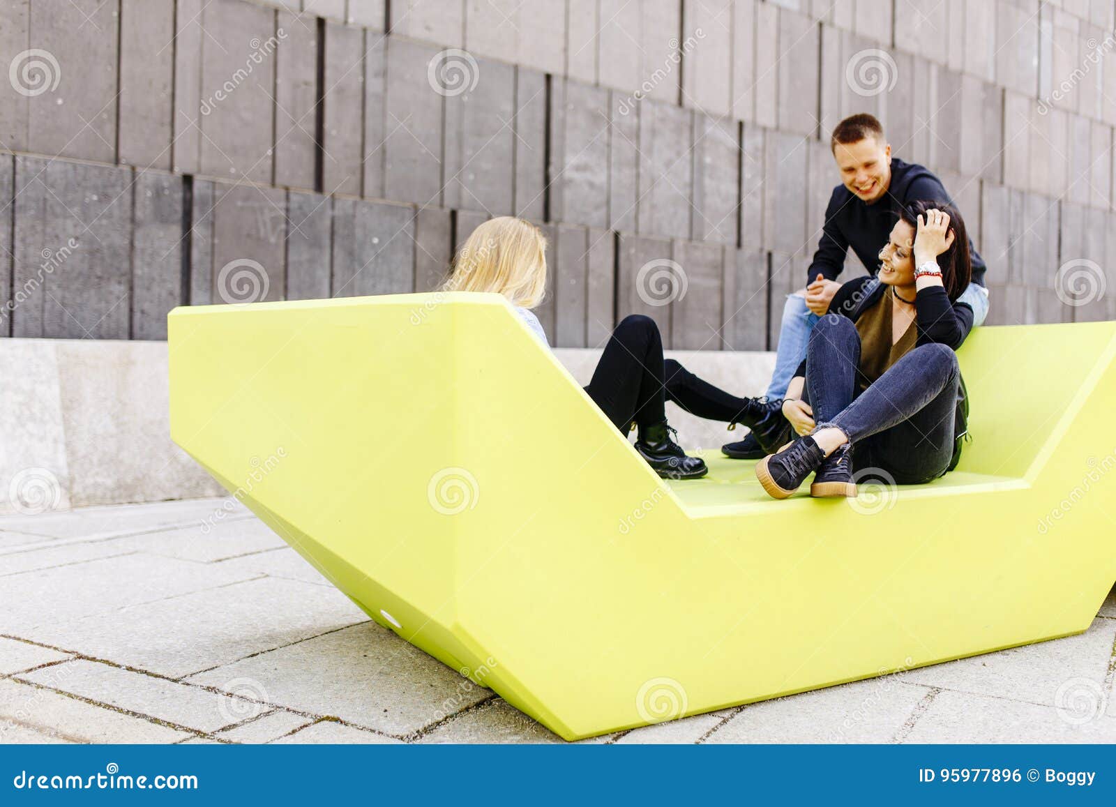 Young People Sitting on the Bench in Vienna, Austria Stock Photo ...