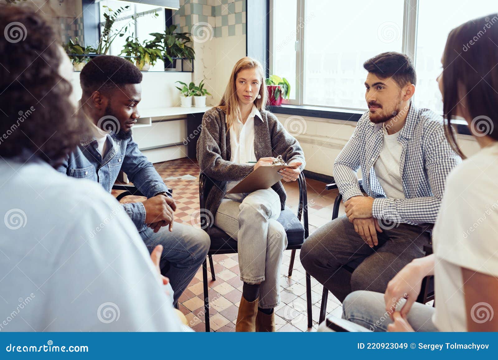 Young People Sitting in a Circle and Having a Discussion Stock Image ...
