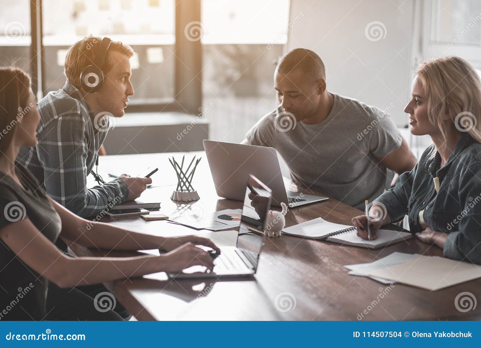 Four Students Doing Group Assignment Stock Photo - Image of discussion ...