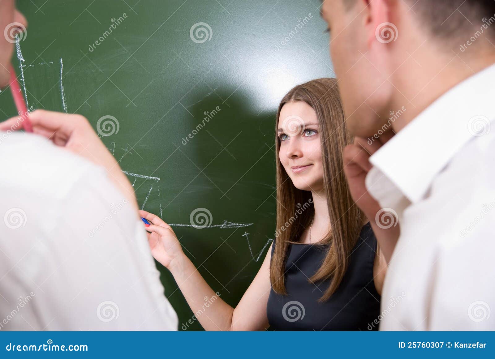 Young People Solve a Problem on a Board Stock Image - Image of ...