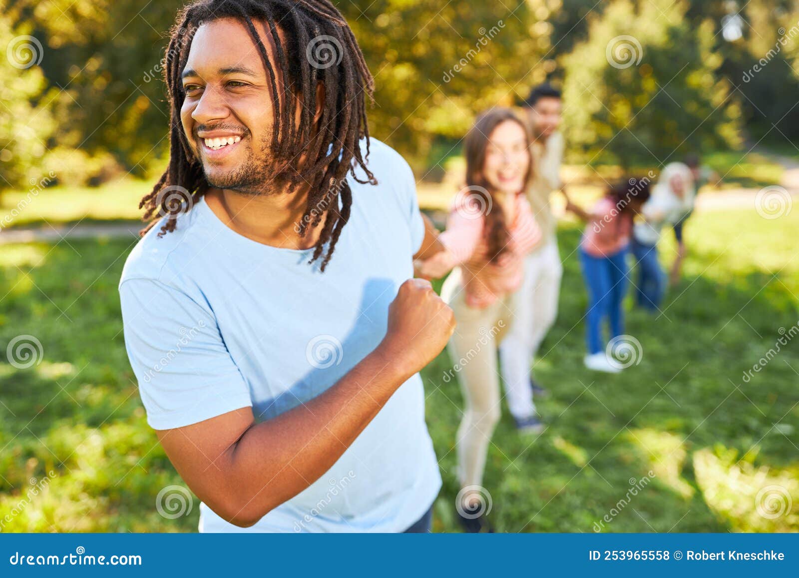 Young People Stand Hand in Hand in Team Building Workshop Stock Photo ...