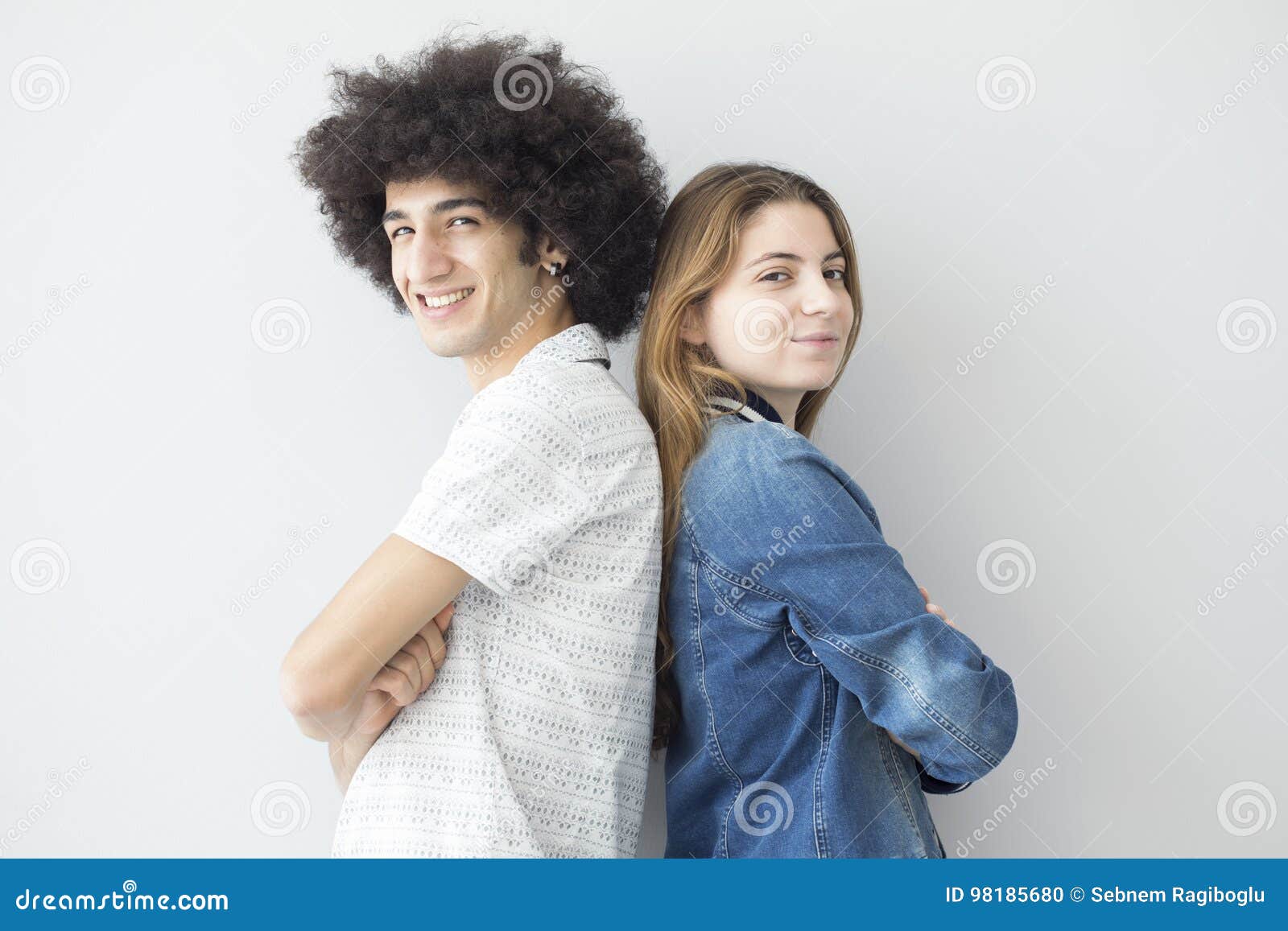 Young People Standing Back To Back Stock Photo - Image of portrait ...