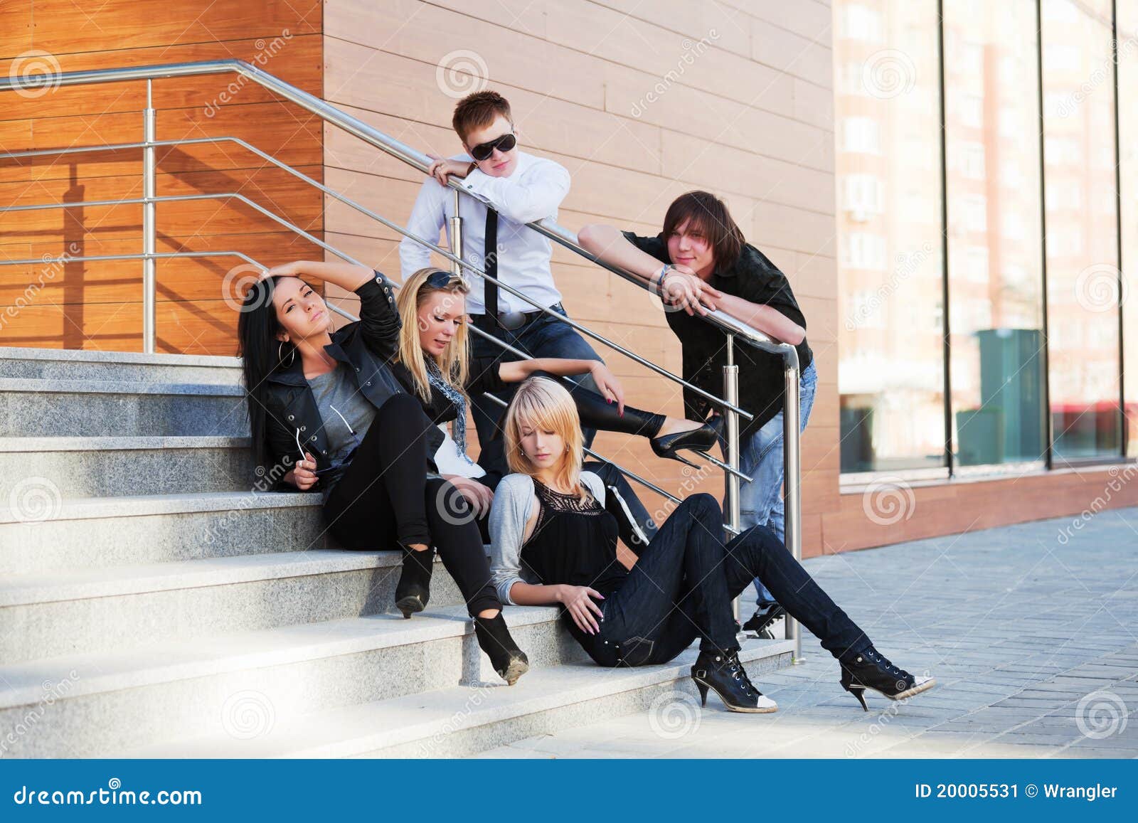 Young people on the steps stock image. Image of friendship - 20005531