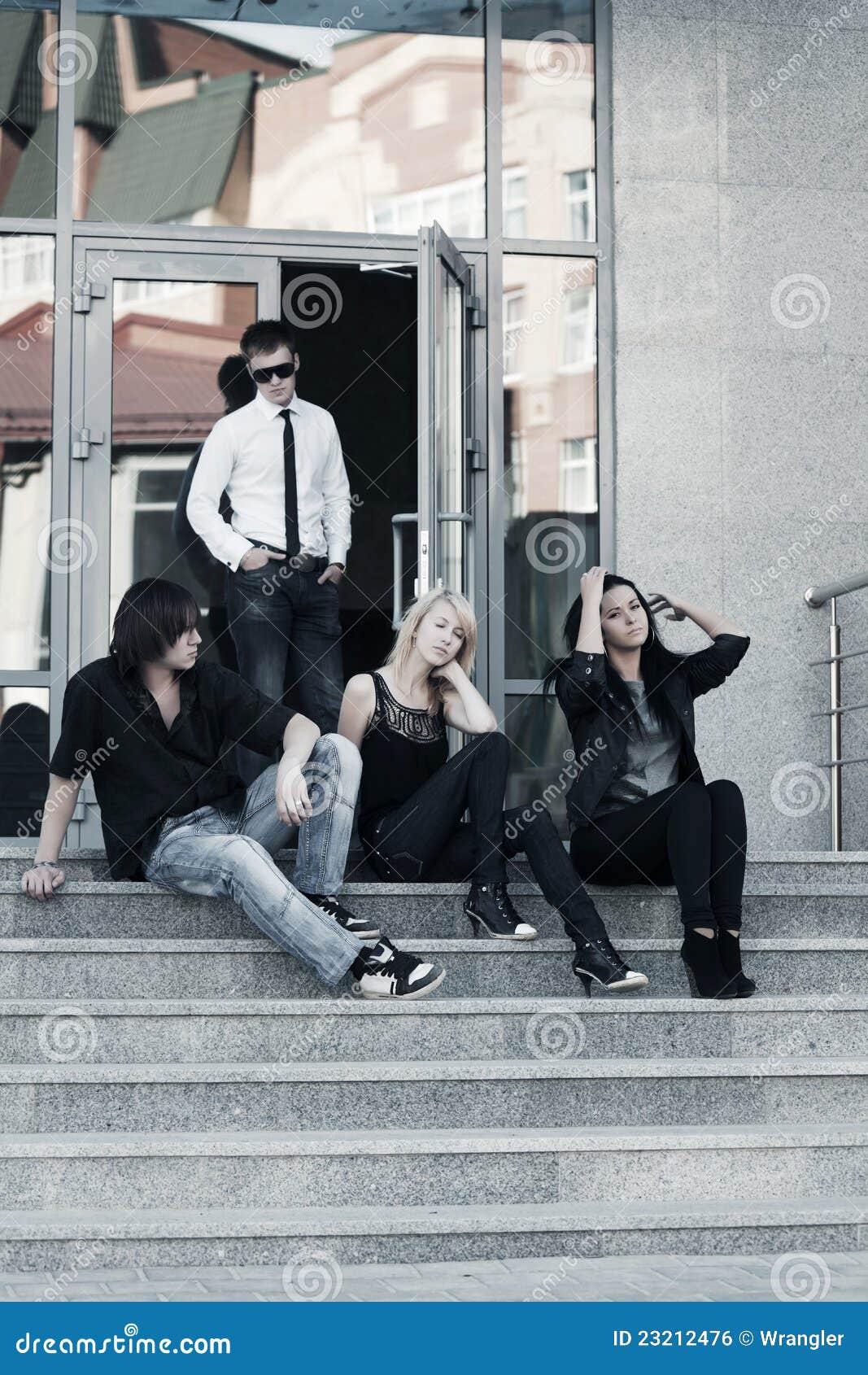 Young people on the steps stock photo. Image of house - 23212476