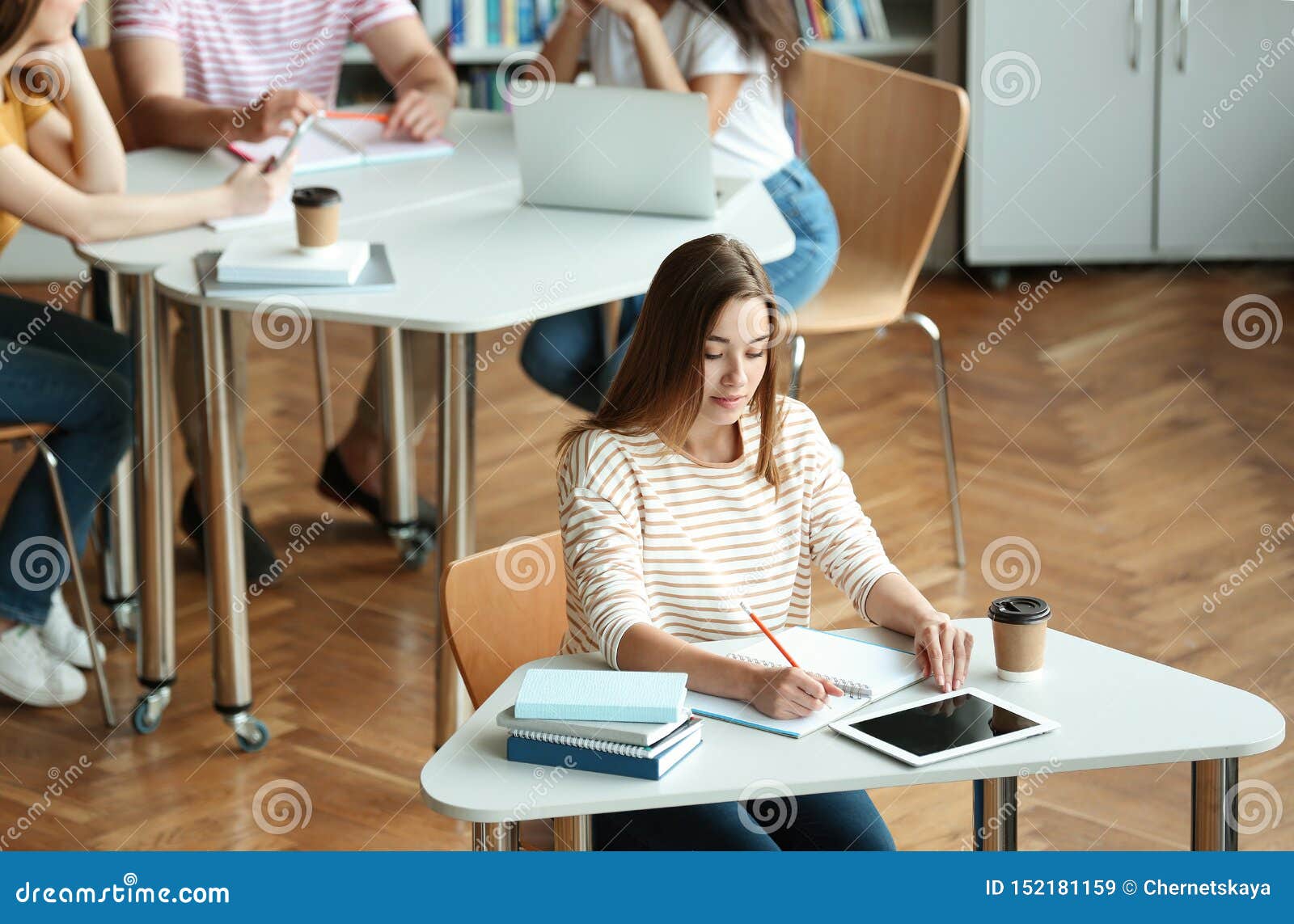 Young People Studying at Tables Stock Image - Image of clever, angle ...