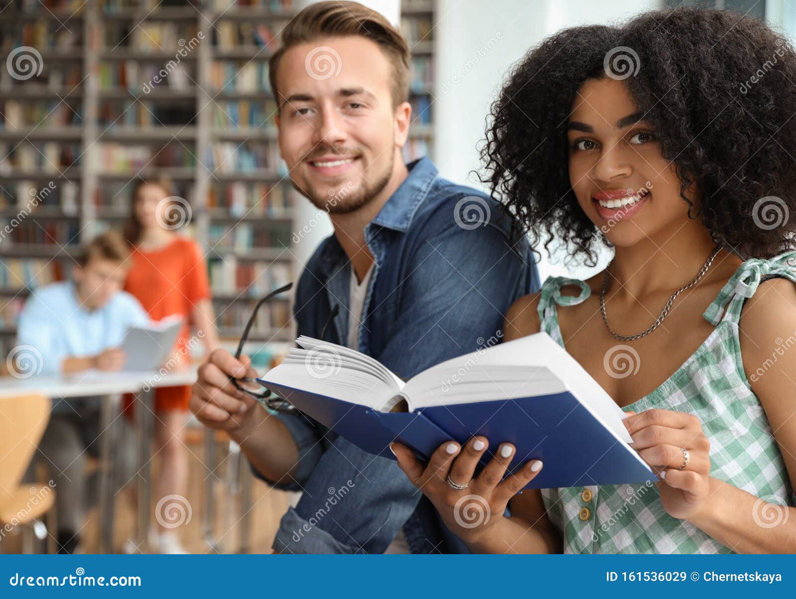 Young People Studying Together in Library Stock Image - Image of ...