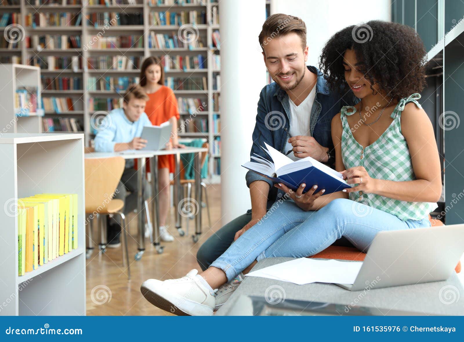 Young People Studying Together in Library Stock Photo - Image of ...