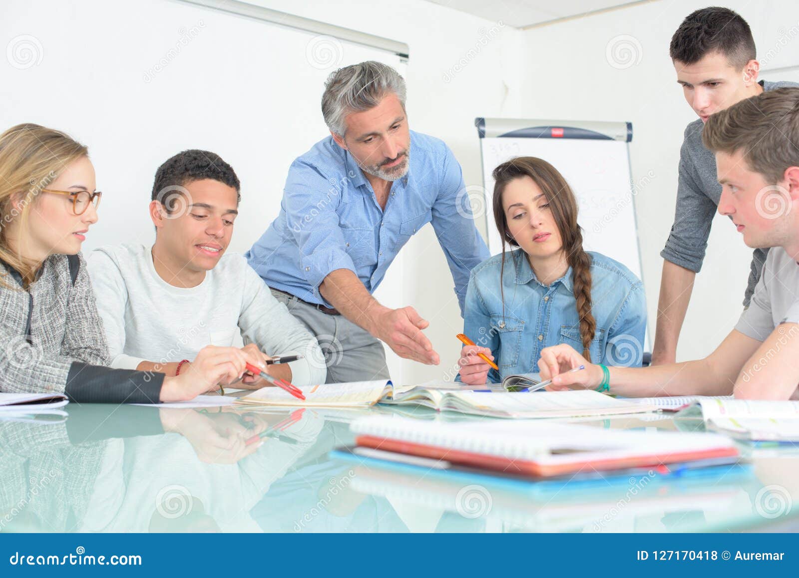 Young People Teacher Discuss Communicate University Classroom Stock ...