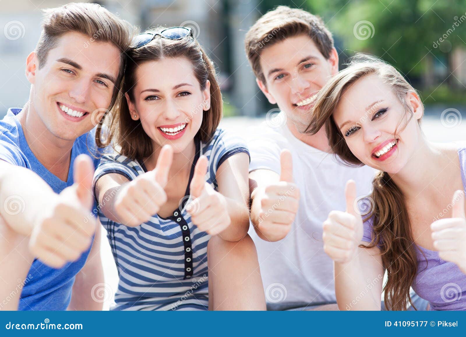 Young People with Thumbs Up Stock Image - Image of casual, friend: 41095177