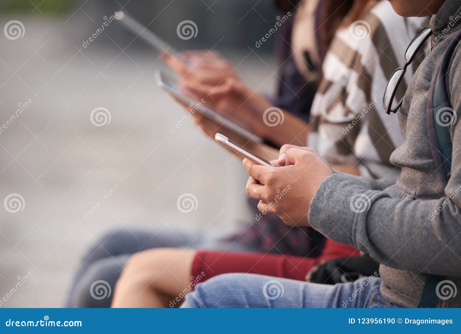 Young people using gadgets stock photo. Image of device - 123956190