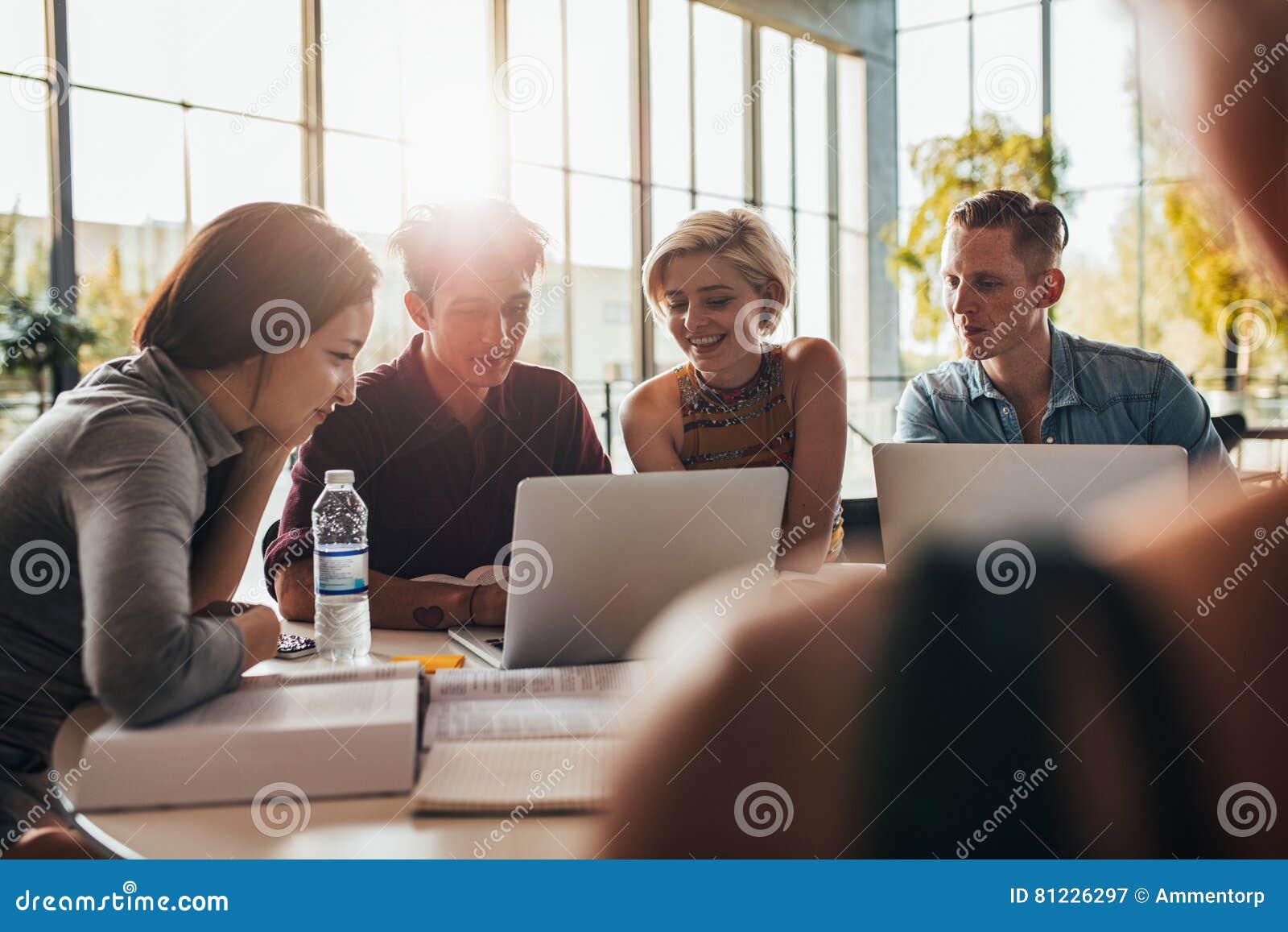 Young People Using Laptop in Class Stock Image - Image of looking ...