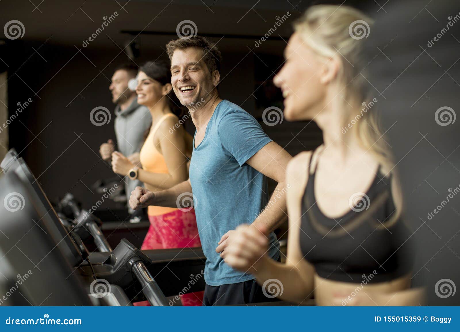 Young People Using Threadmill in Modern Gym Stock Image - Image of ...