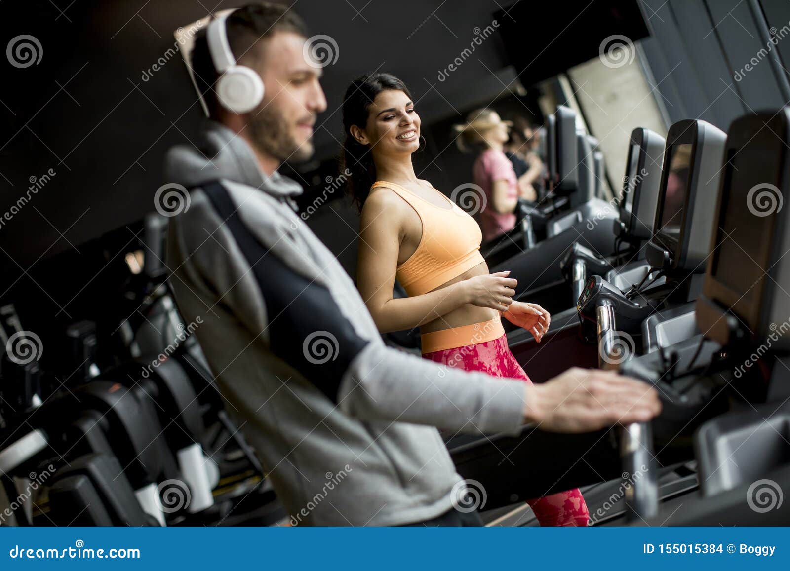 Young People Using Threadmill in Modern Gym Stock Photo - Image of ...