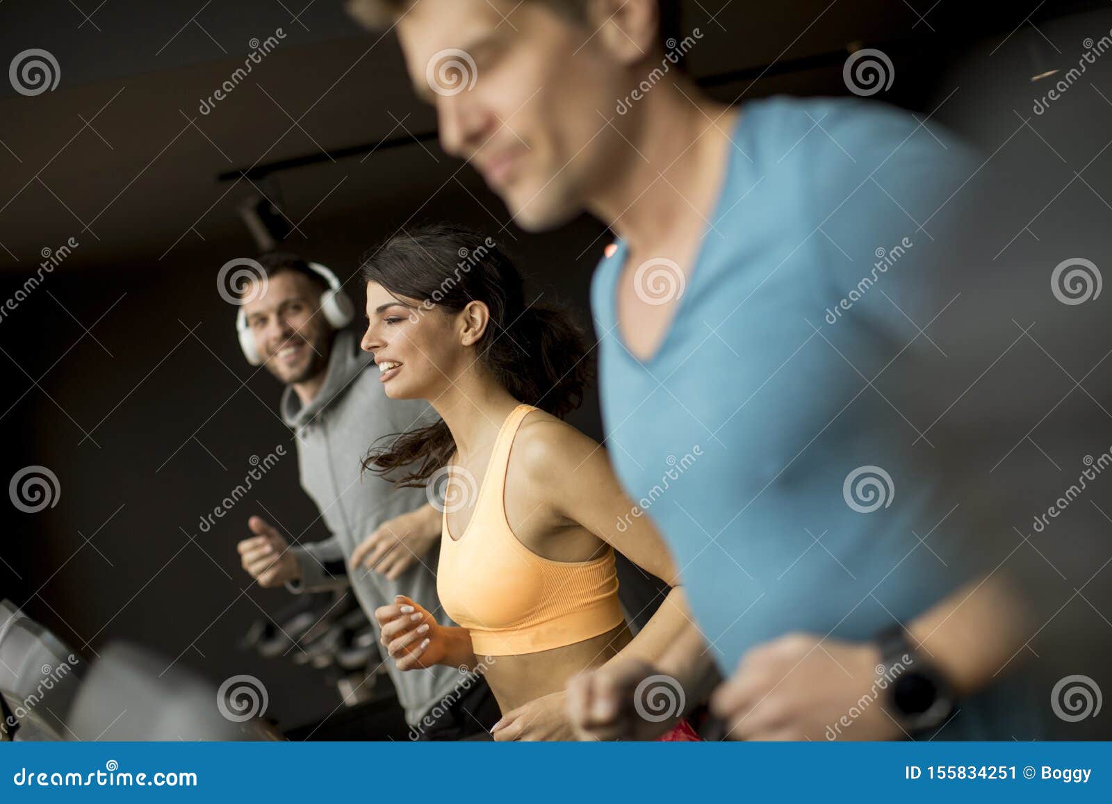 Young People Using Threadmill in Modern Gym Stock Image - Image of ...