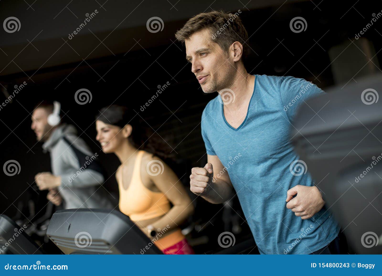 Young People Using Threadmill in Modern Gym Stock Image - Image of ...