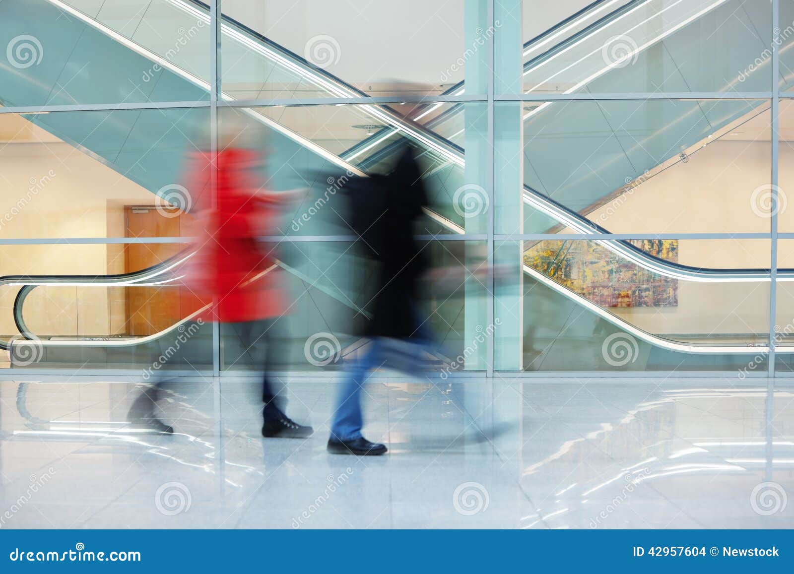 Young People Walking Down Hallway in Office Building, Motion Blu Stock ...