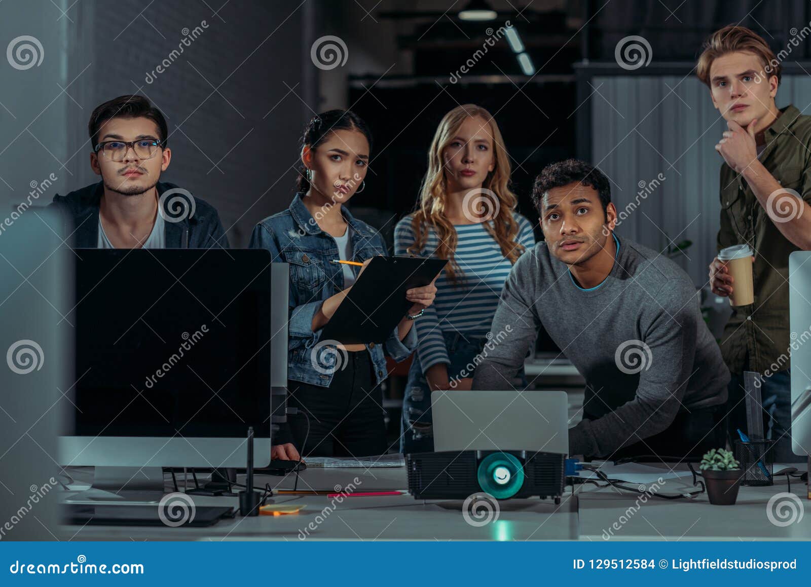 Young People Watching Presentation in Modern Office Stock Photo - Image ...