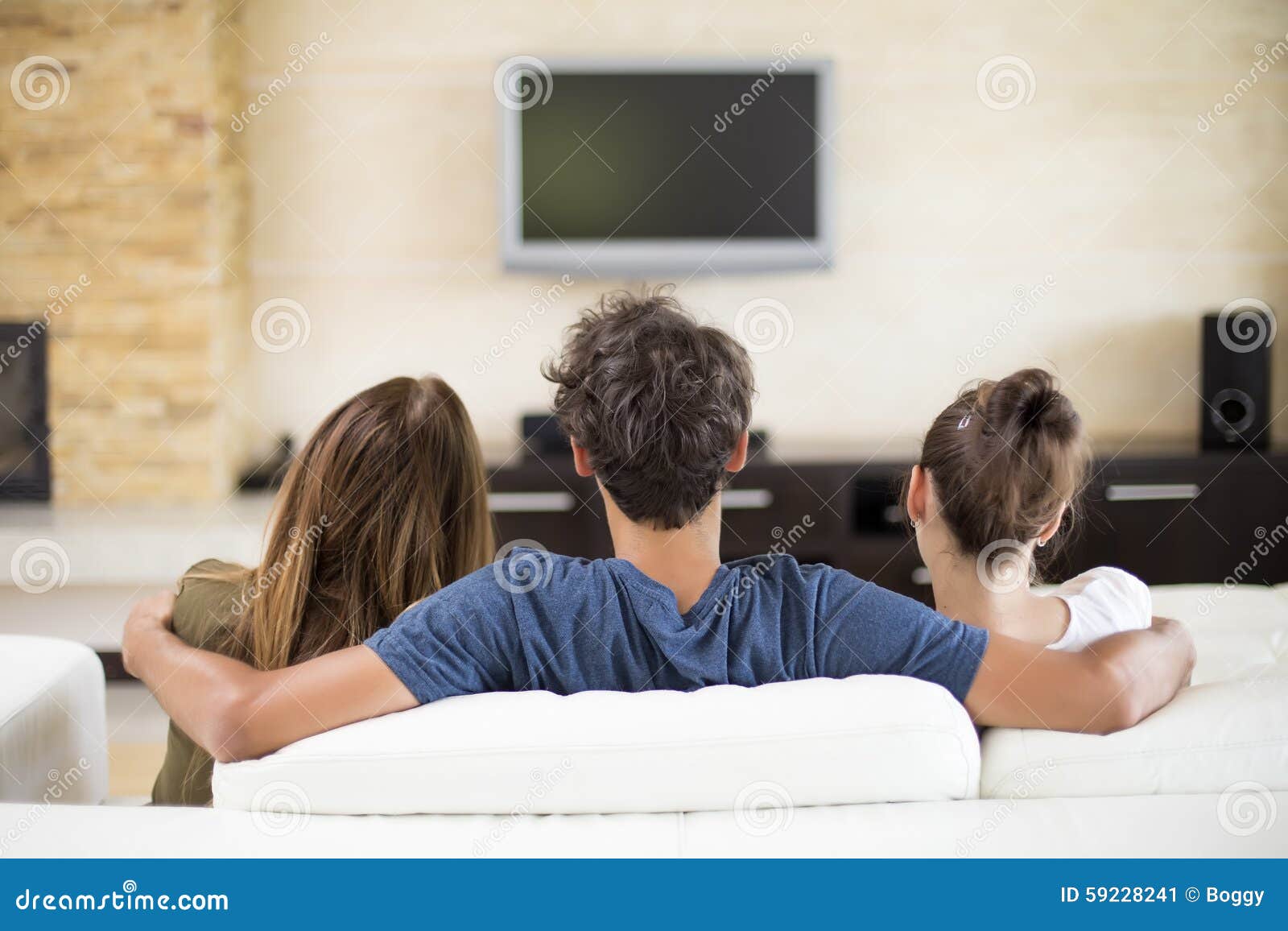 Young people watching tv stock image. Image of casual - 59228241