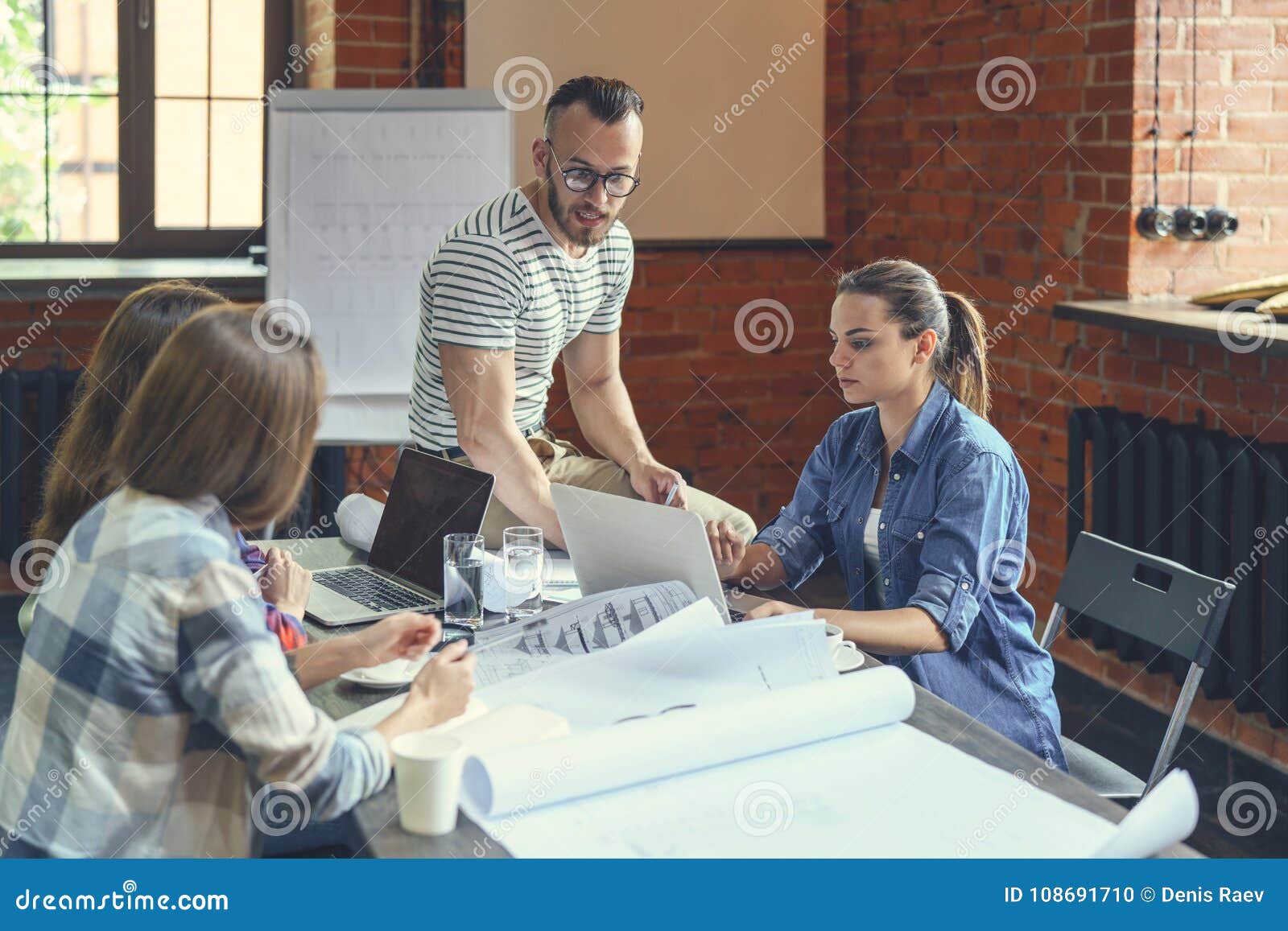 Young people at work stock photo. Image of discussion - 108691710