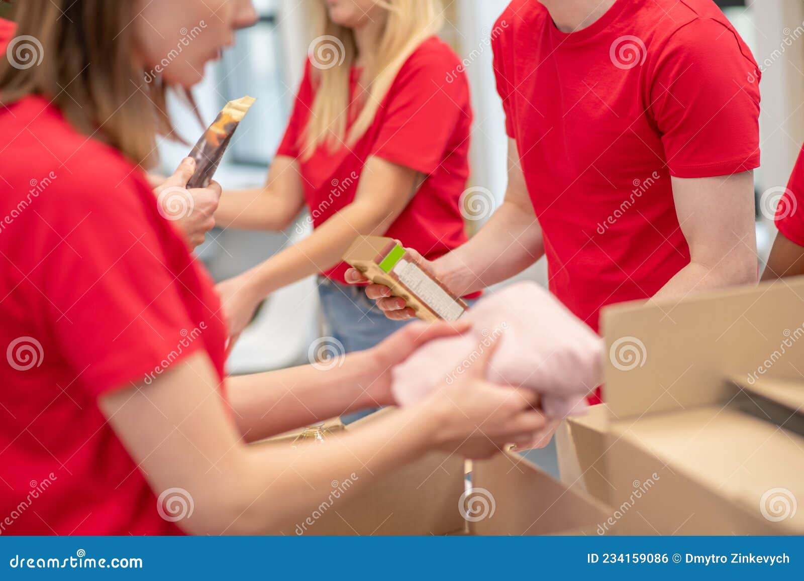 Young People Working in a Donations Distribution Center Stock Photo ...
