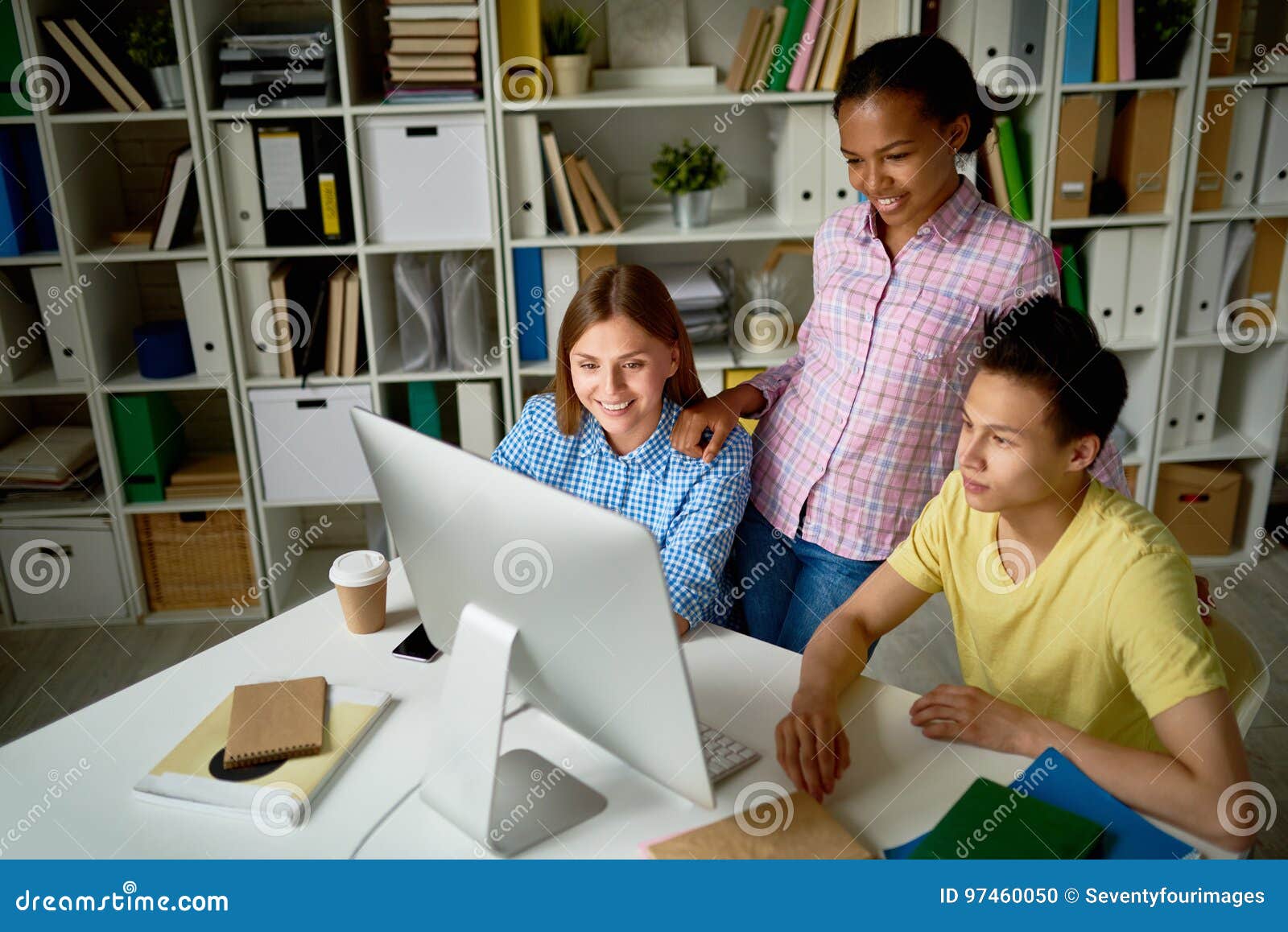 Young People Working in Library Stock Photo - Image of smiling ...