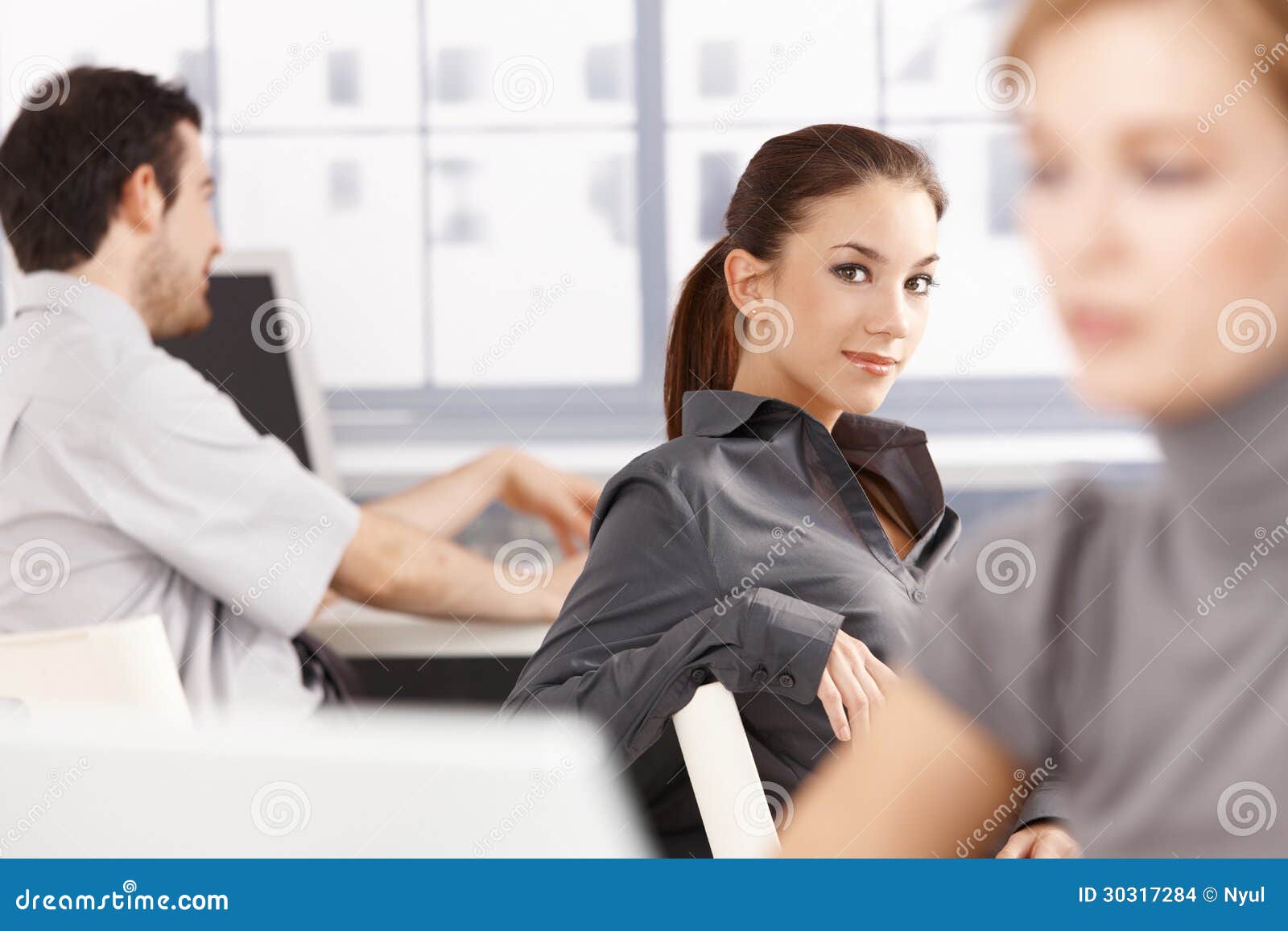 Young People Working in Office Smiling Stock Photo - Image of brunette ...