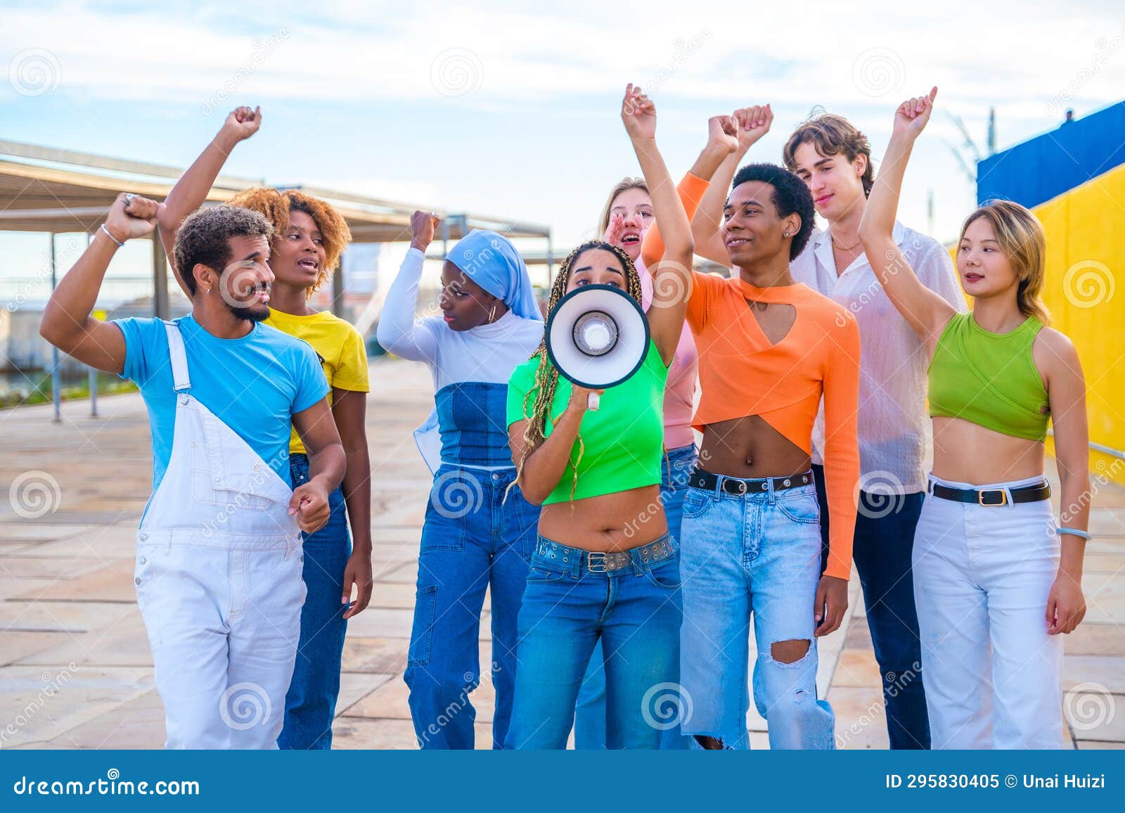 Young People Yelling Using a Loudspeaker in a Protest Stock Image ...