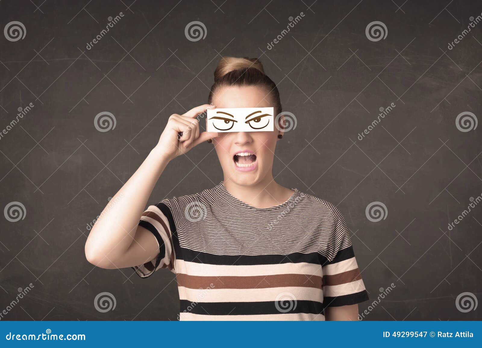 Young Person Holding Paper with Angry Eye Drawing Stock Image - Image ...