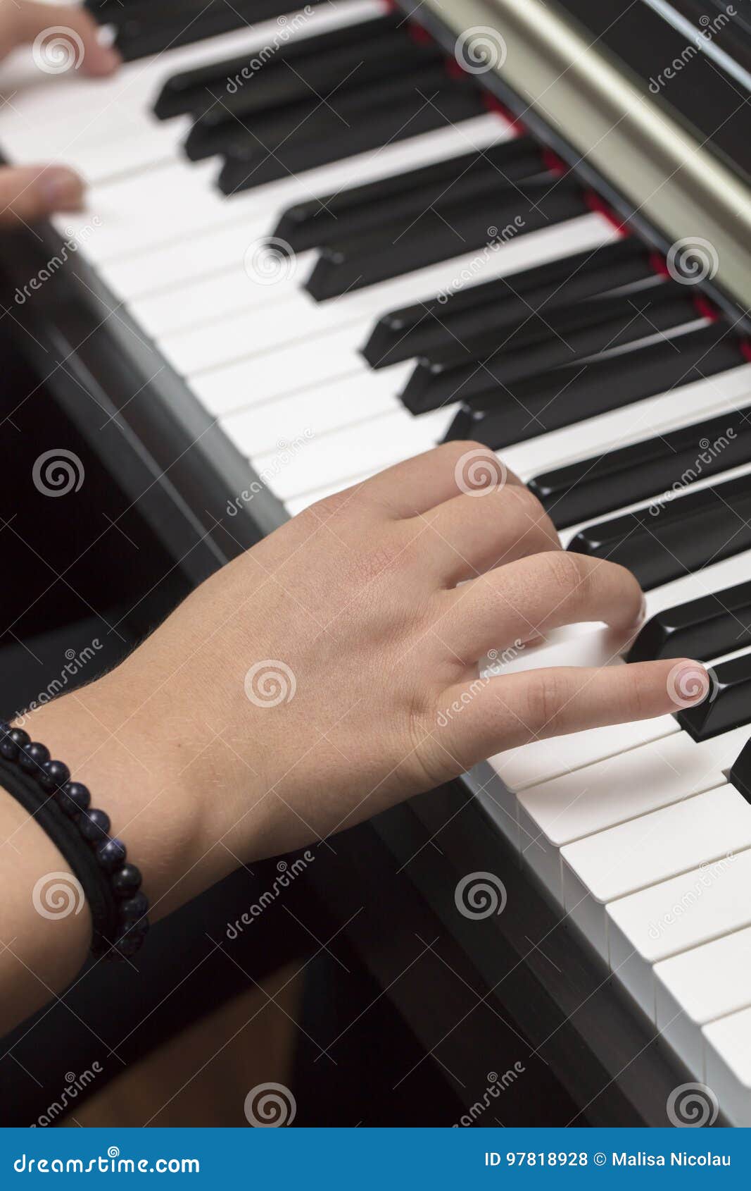 Young Person Playing the Piano with Both Hands Stock Photo - Image of ...
