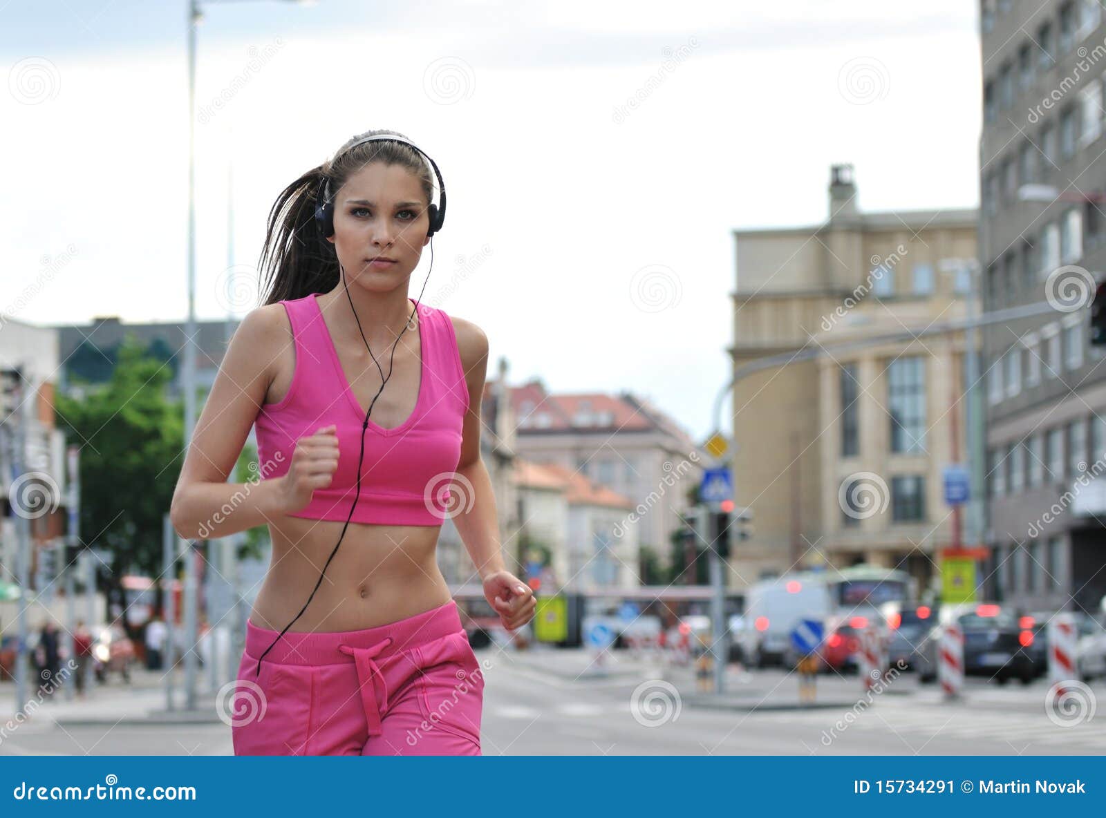 Young Person Running in City Road Stock Image - Image of buildings ...
