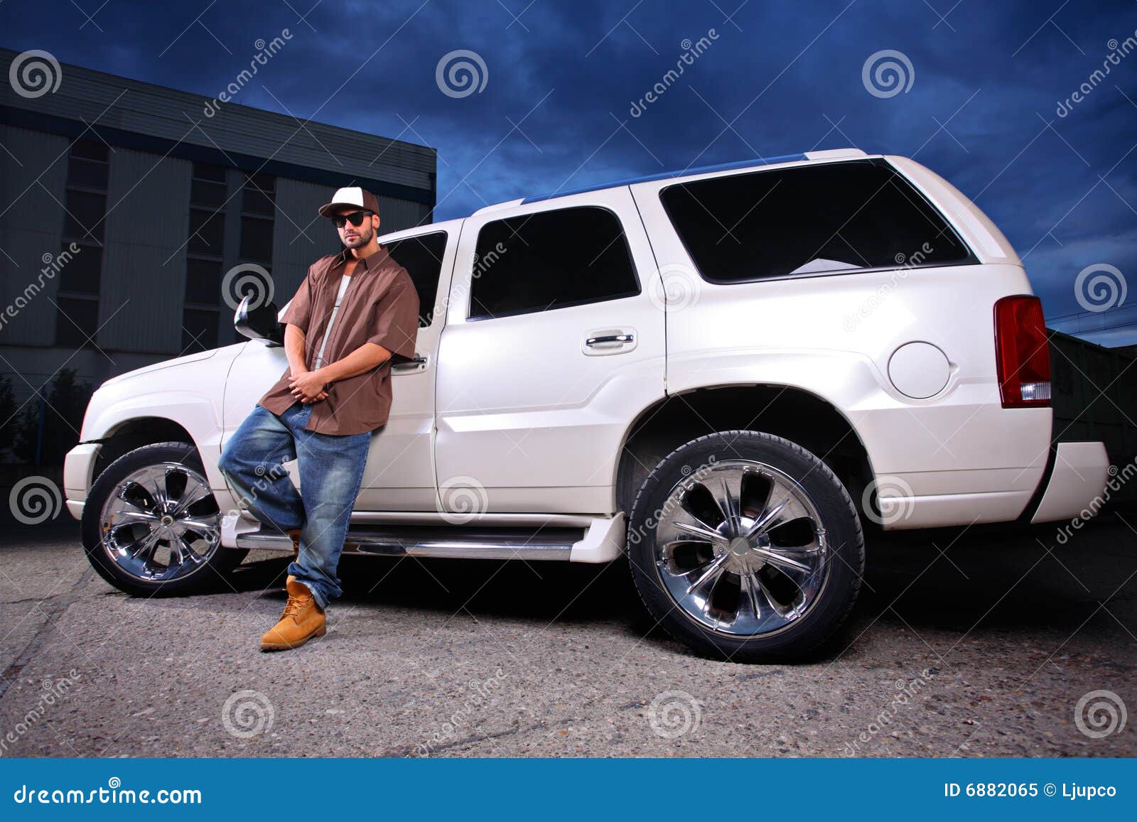 Young Person Standing Next To SUV Stock Image - Image of blue, auto ...