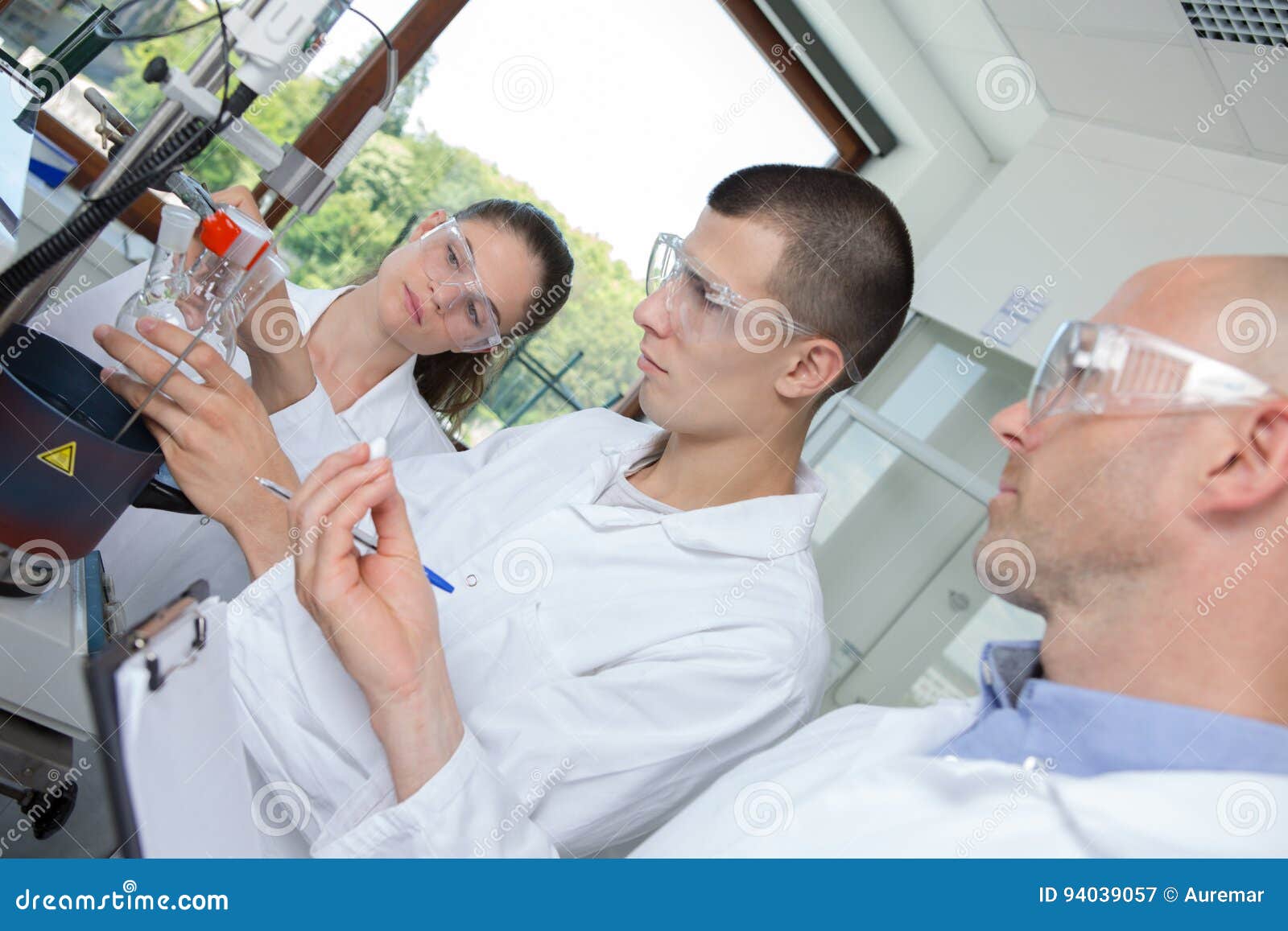 Young Phd Student Scientist Looking through Microscope Stock Image ...