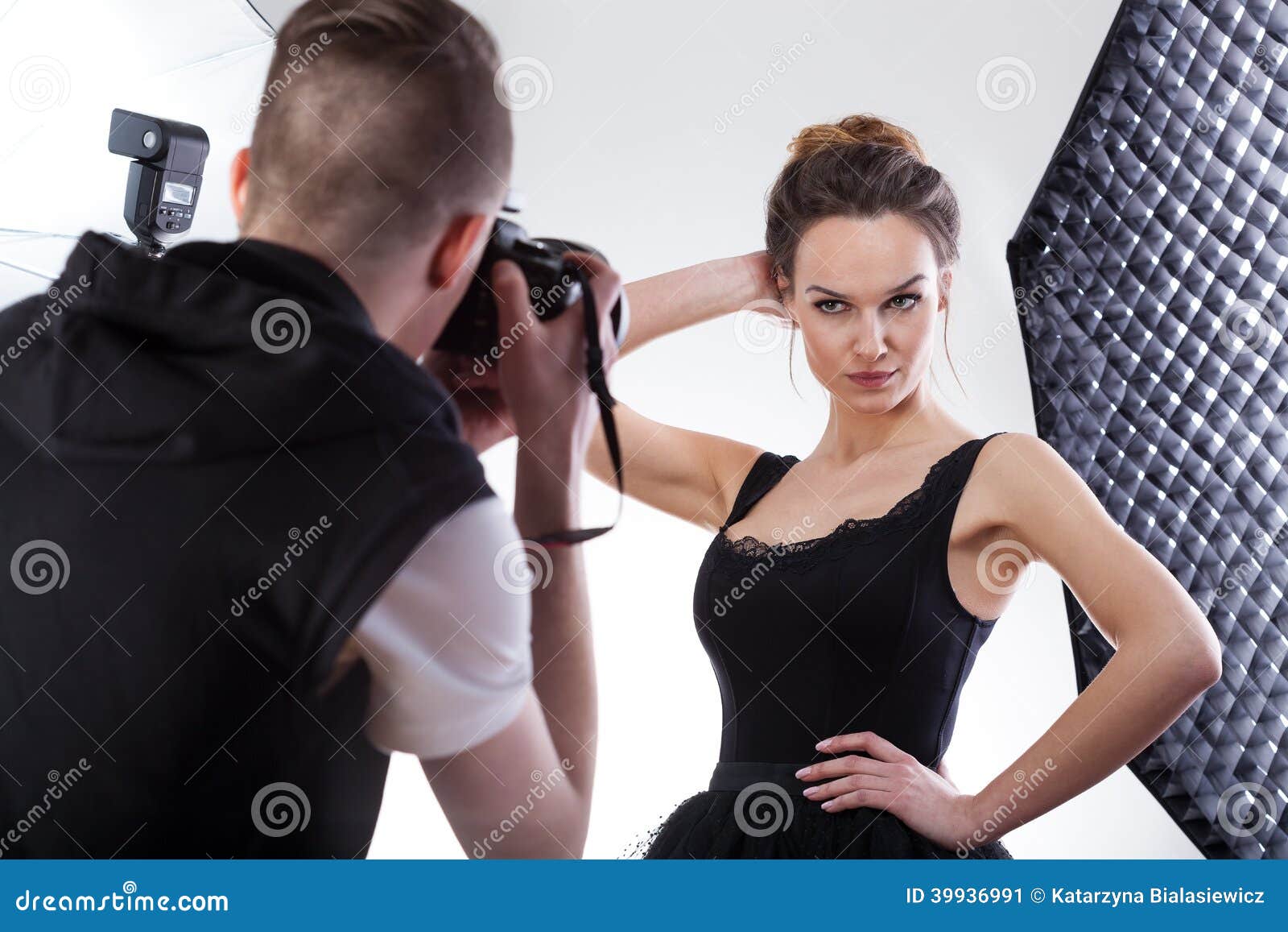 Young Photographer Working with Professional Model Stock Image - Image ...
