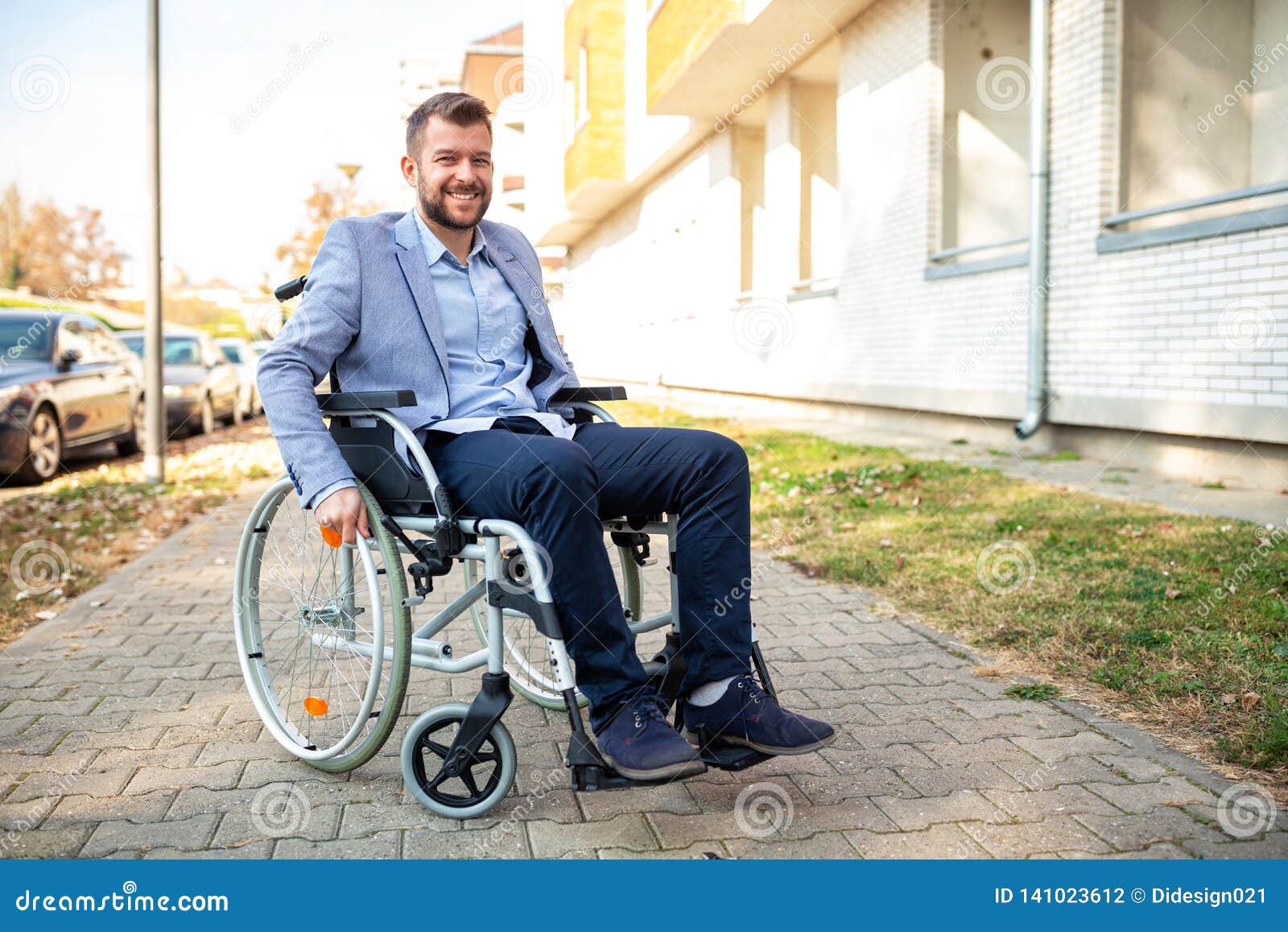 Young Physically Challenged Man in His Wheelchair Stock Photo - Image ...