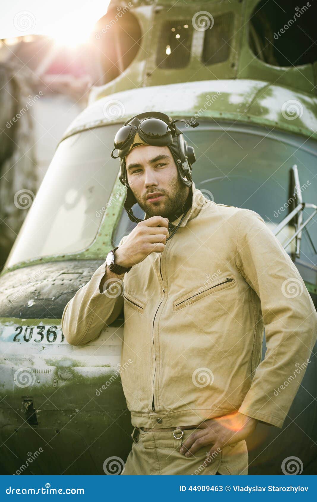 Young Pilot Posing Near the Helicopter Stock Image - Image of outdoor ...